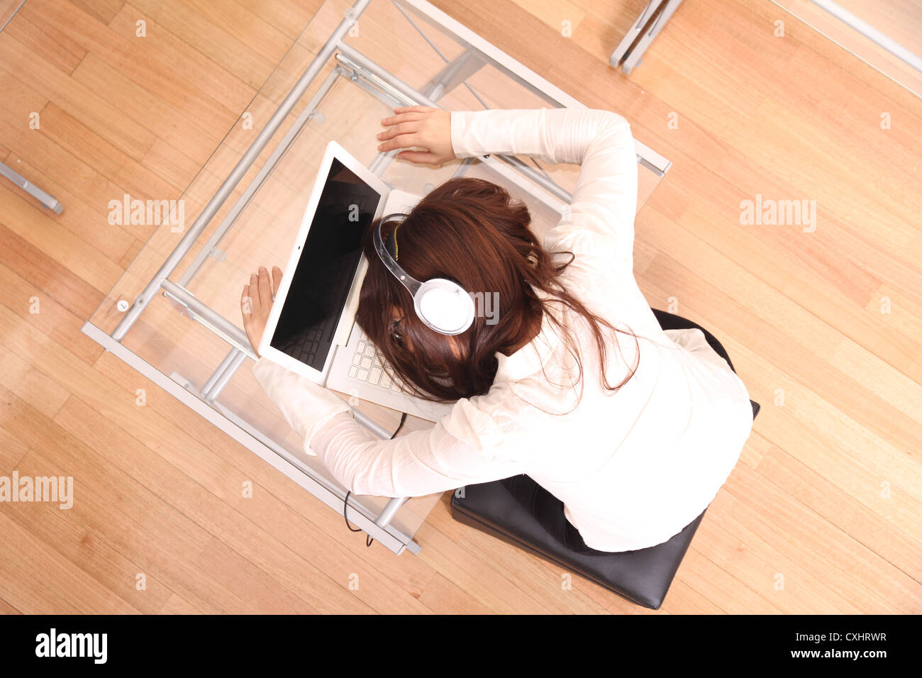 A woman sleeping on the Laptop Stock Photo - Alamy