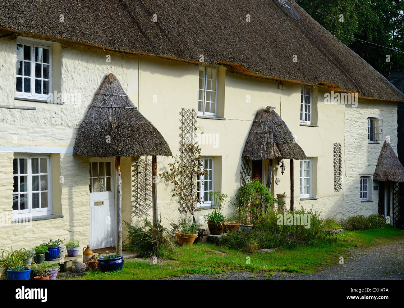 Thatched cottages in the hamlet of St.Clement near Truro, Cornwall, UK ...
