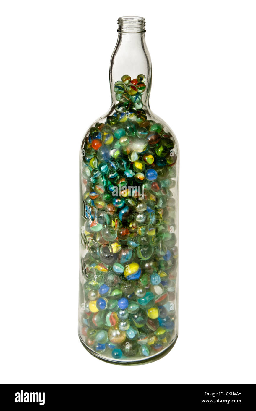 Large Scotch whisky bottle full of marbles Stock Photo - Alamy