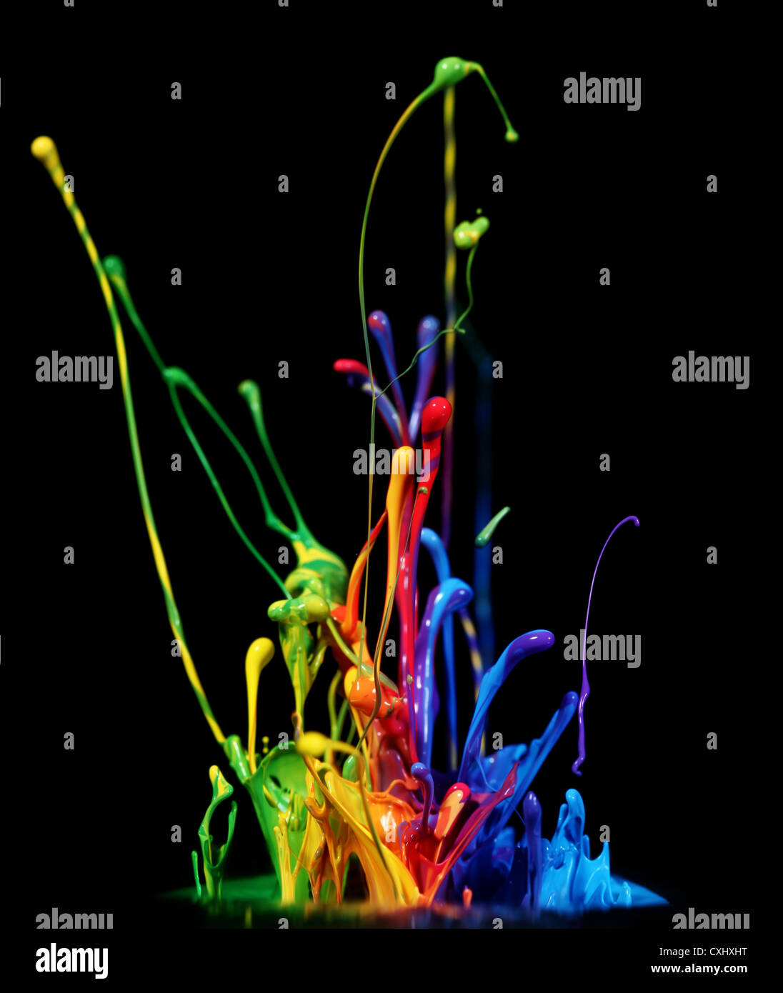 Colorful paint splashing Stock Photo - Alamy