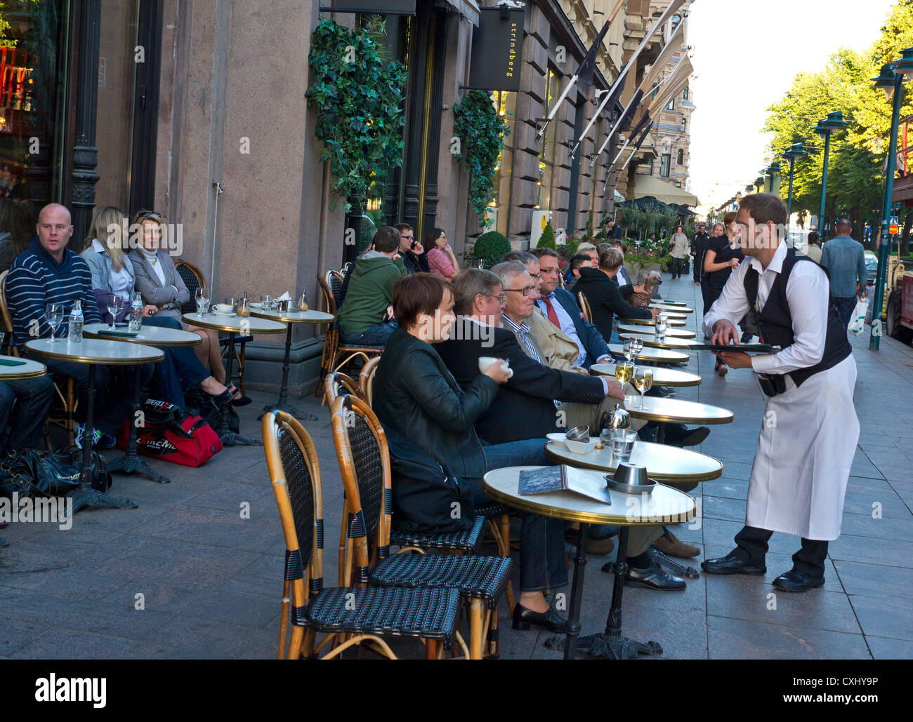 HELSINKI CAFE Traditional waiter service at Strindberg alfresco cafe on ...