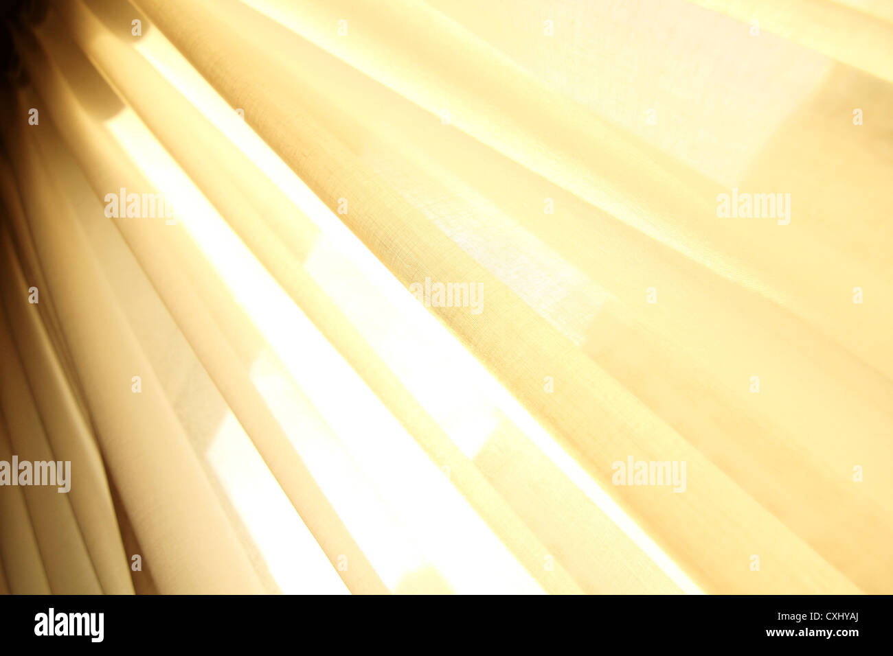 Sunlight falling through a semi transparent curtain Stock Photo - Alamy