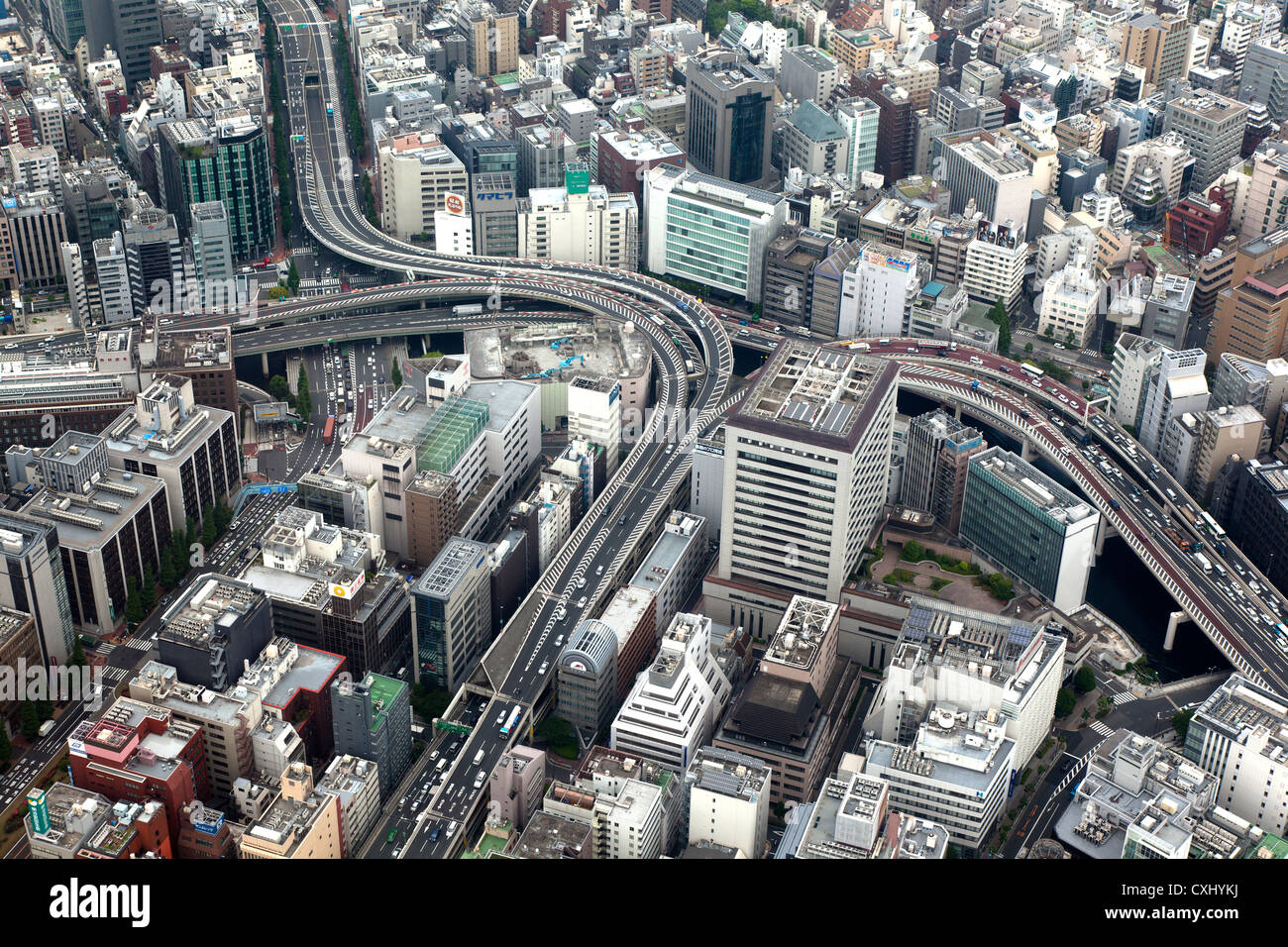 Aerial shot of crowded road network snaking through central Tokyo ...