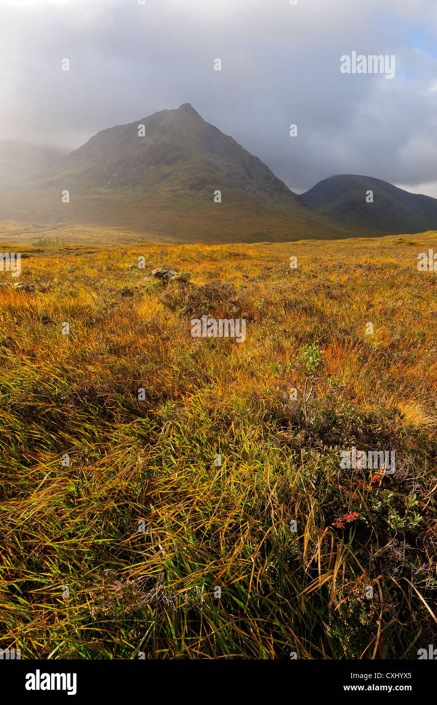 Autumn colours and stormy skies in Glencoe, Scottish Highlands Stock ...