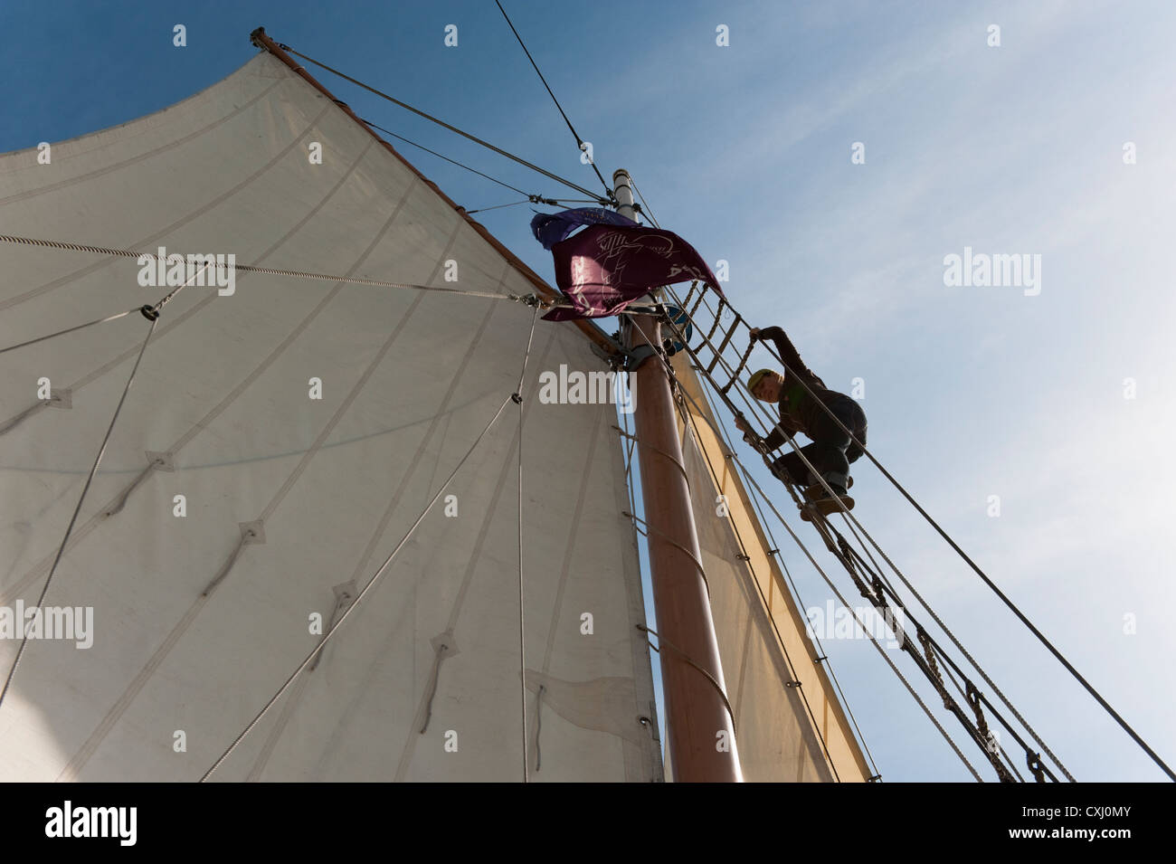 Woman climbs rigging schooner set hi-res stock photography and images ...