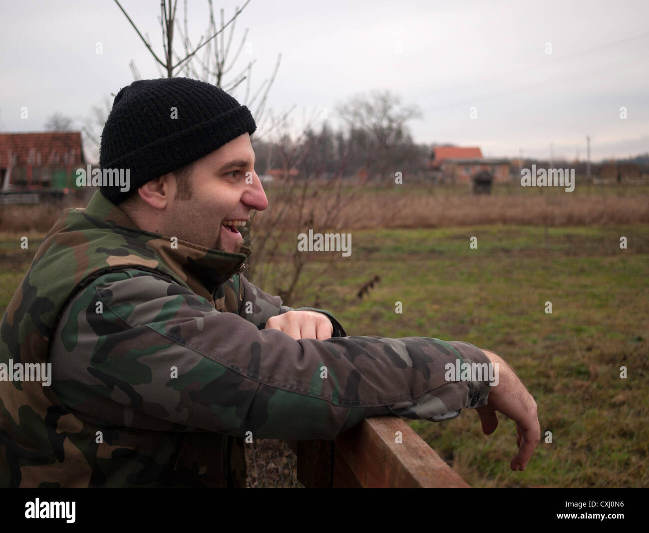 Peasant on a field Stock Photo - Alamy