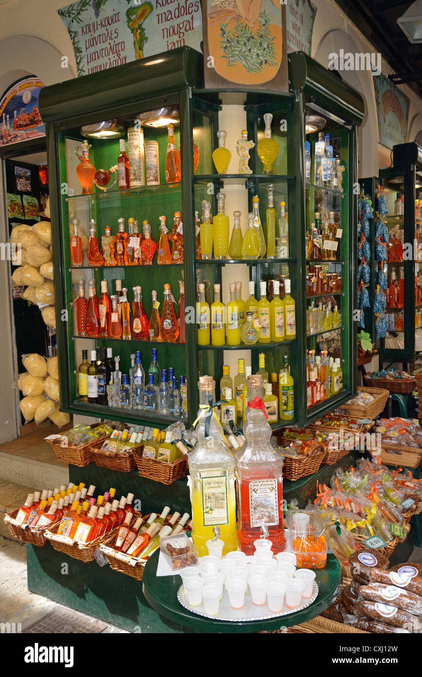 Kumquat and lemon liqueurs for sale in souvenir shop, Old Corfu Town ...