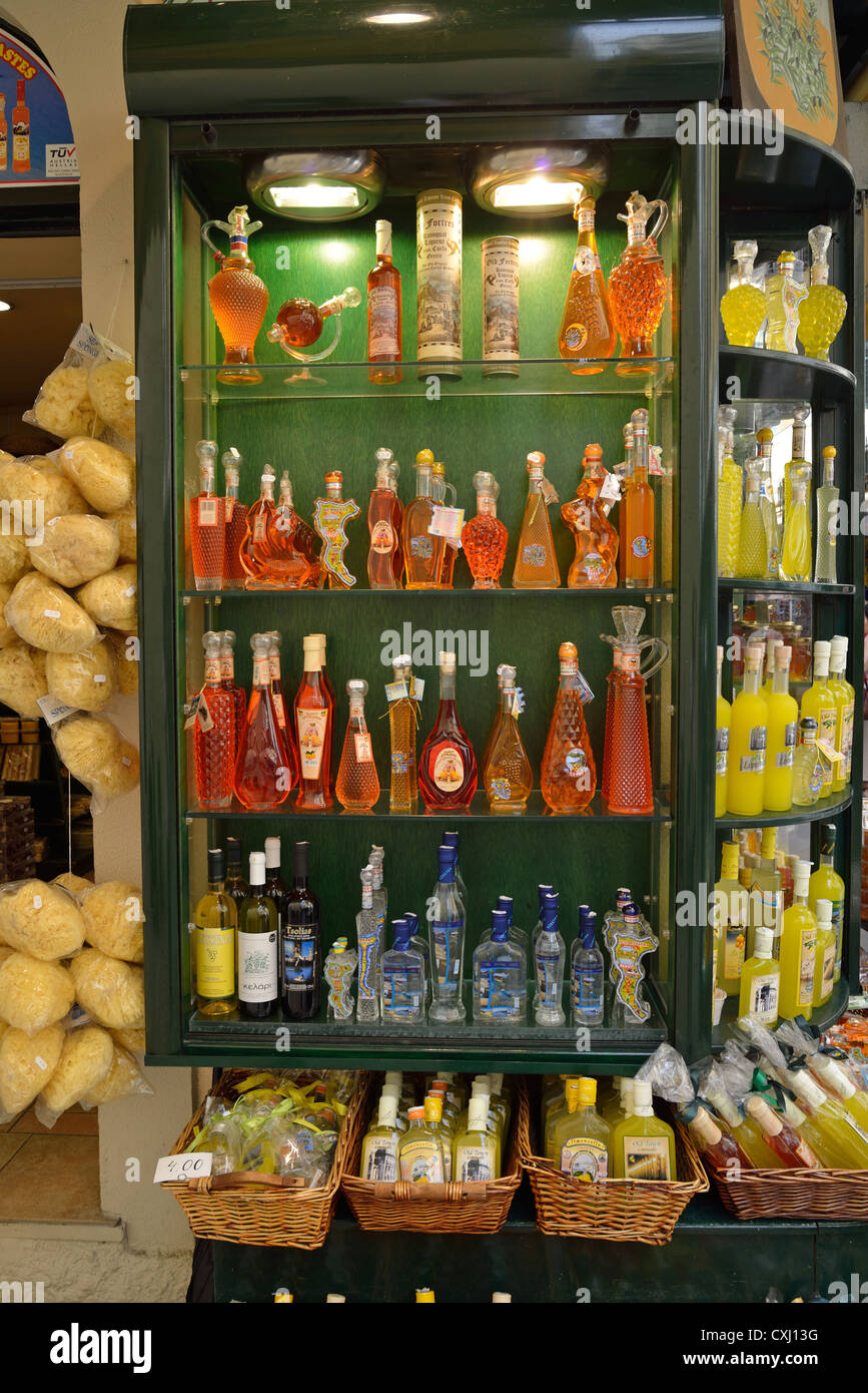 Kumquat and lemon liqueurs for sale in souvenir shop, Old Corfu Town ...
