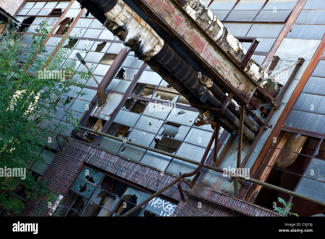 abandoned powerplant with damaged asbestos isolation Stock Photo - Alamy