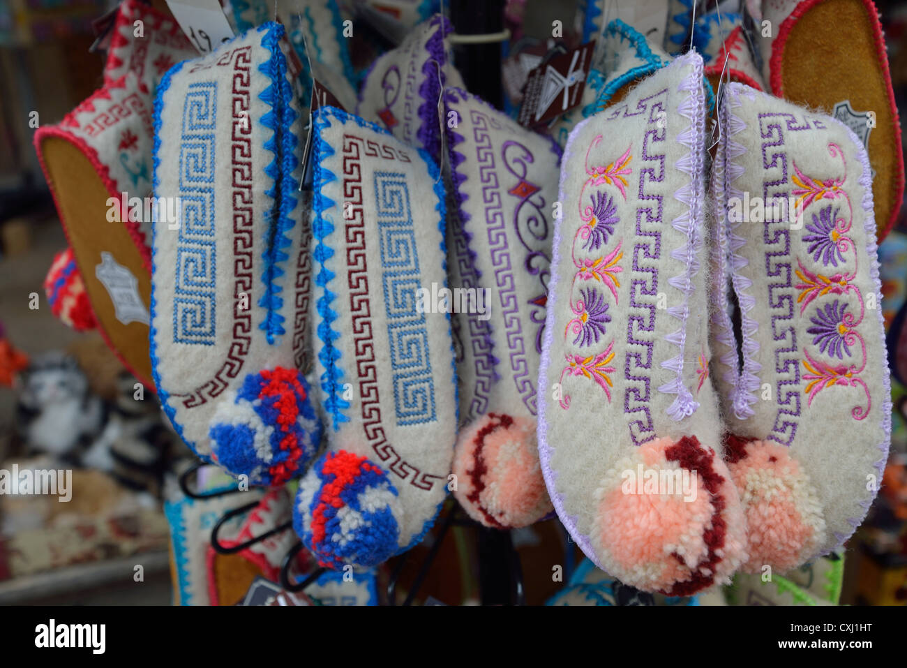 Traditional Greek souvenir slippers in souvenir shop, Old Corfu Town ...