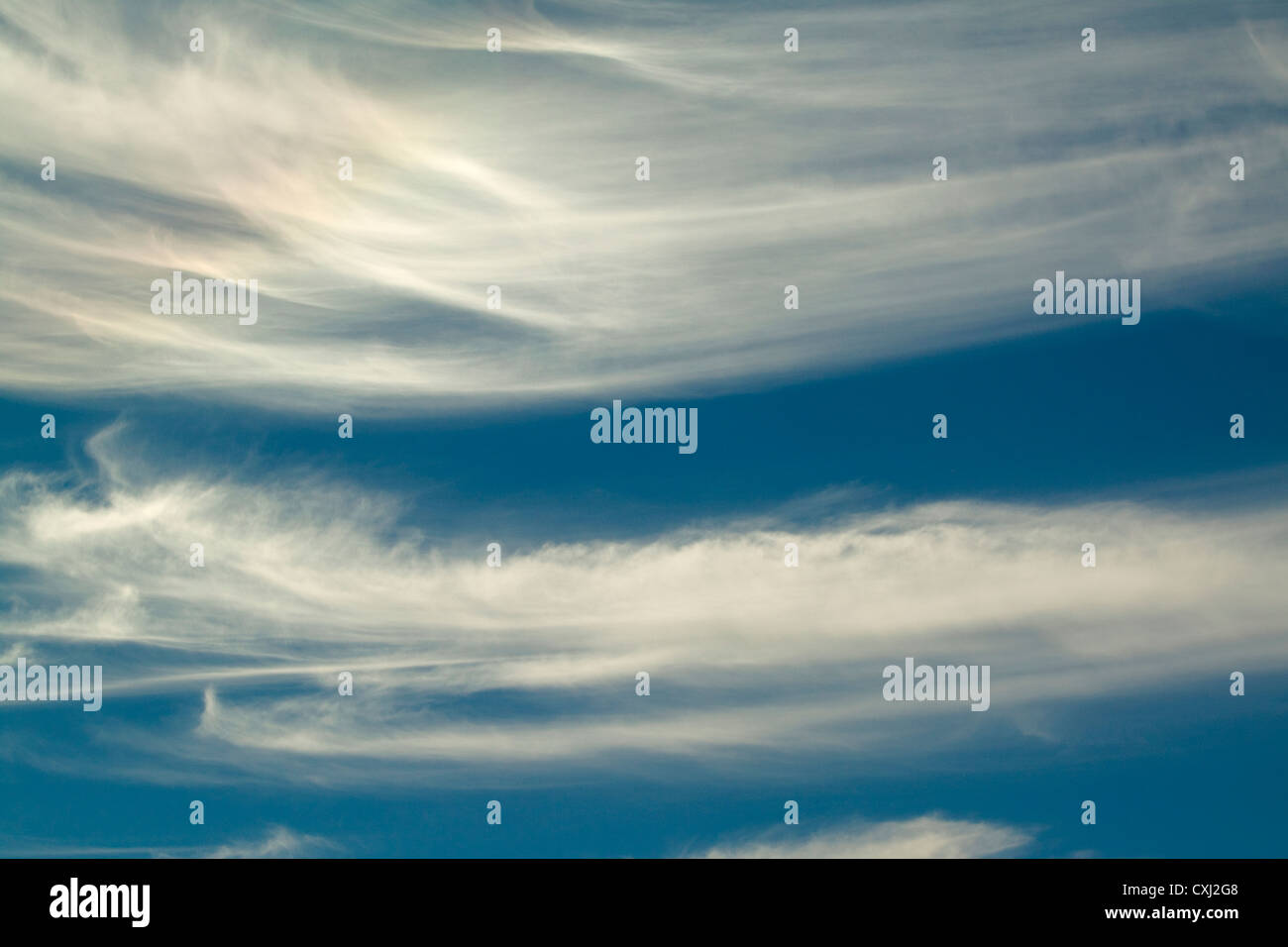 Cirrus clouds with edge of halo Stock Photo - Alamy