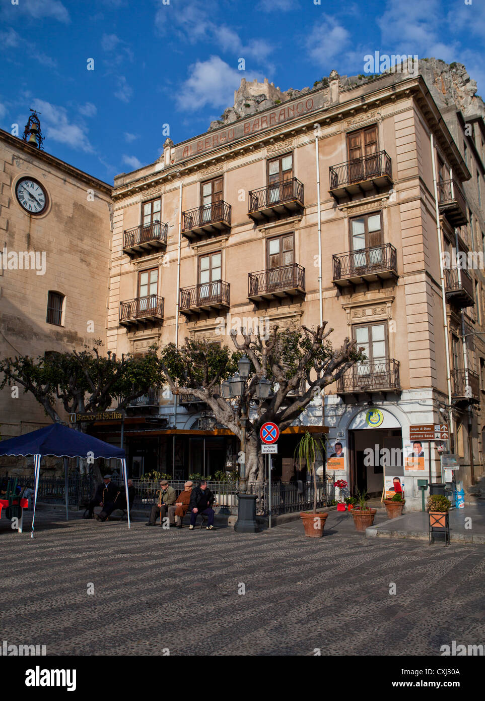 Sicilian building and street scene in Cefalu, sicily Stock Photo - Alamy