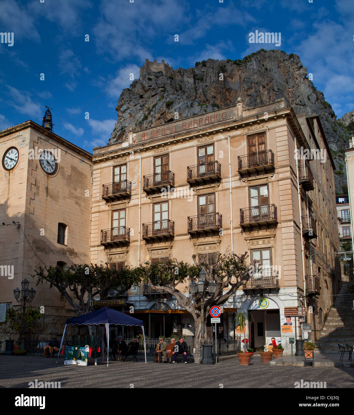 Sicilian building and street scene in Cefalu, sicily Stock Photo - Alamy