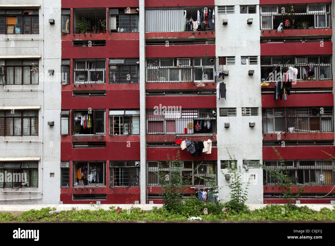 It's a photo of a detail of a council flat in Hong Kong. We can see ...