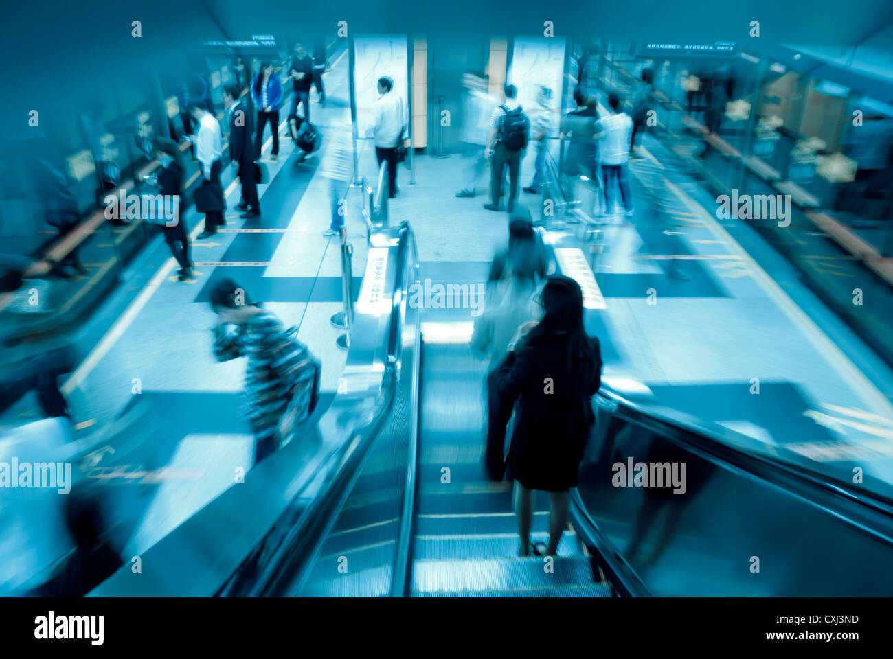 passenger on moving escalator Stock Photo - Alamy