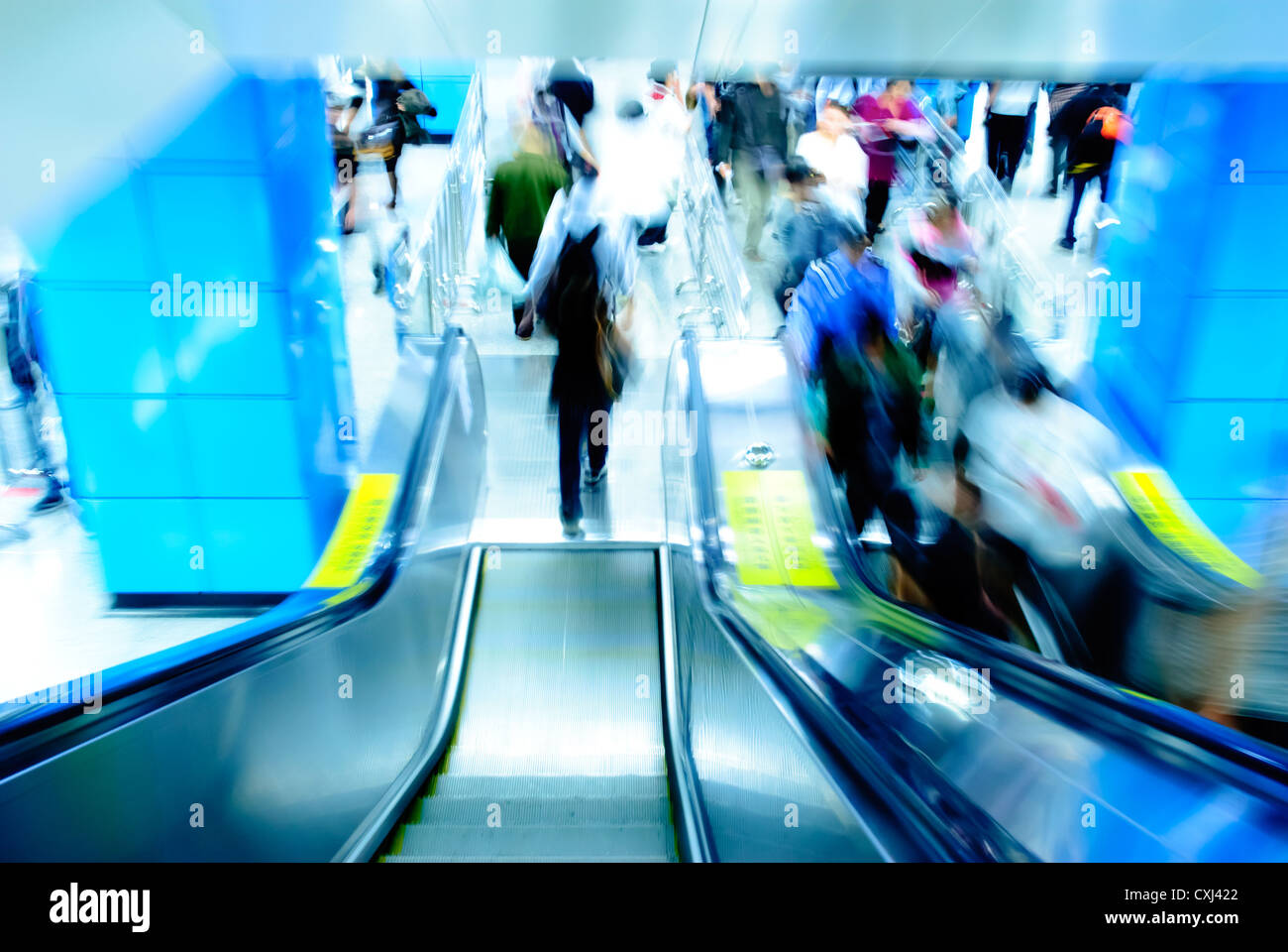 passenger on moving escalator Stock Photo - Alamy