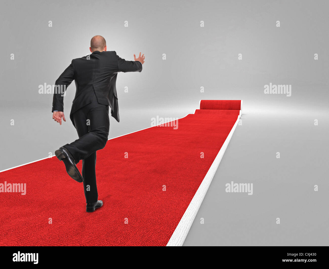 businessman run on 3d red carpet Stock Photo - Alamy
