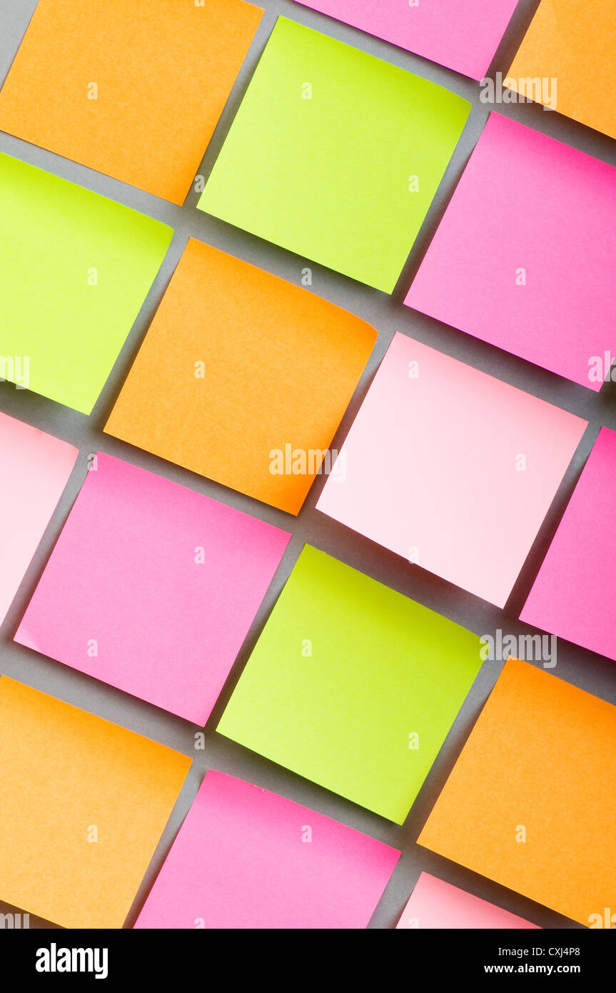 Reminder notes on the bright colorful paper Stock Photo - Alamy