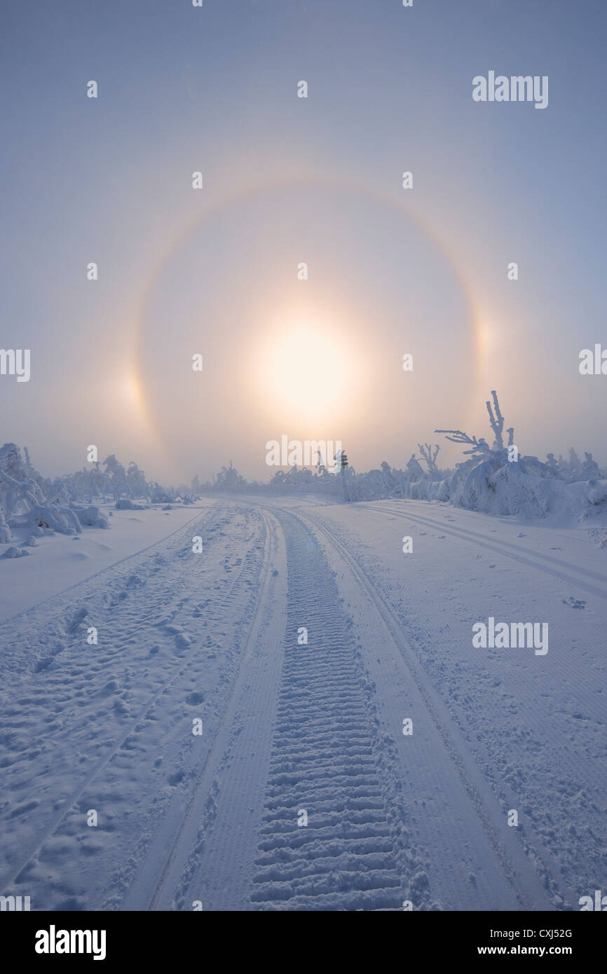 Germany, Saxony, View of sundog with snowy landscape Stock Photo - Alamy