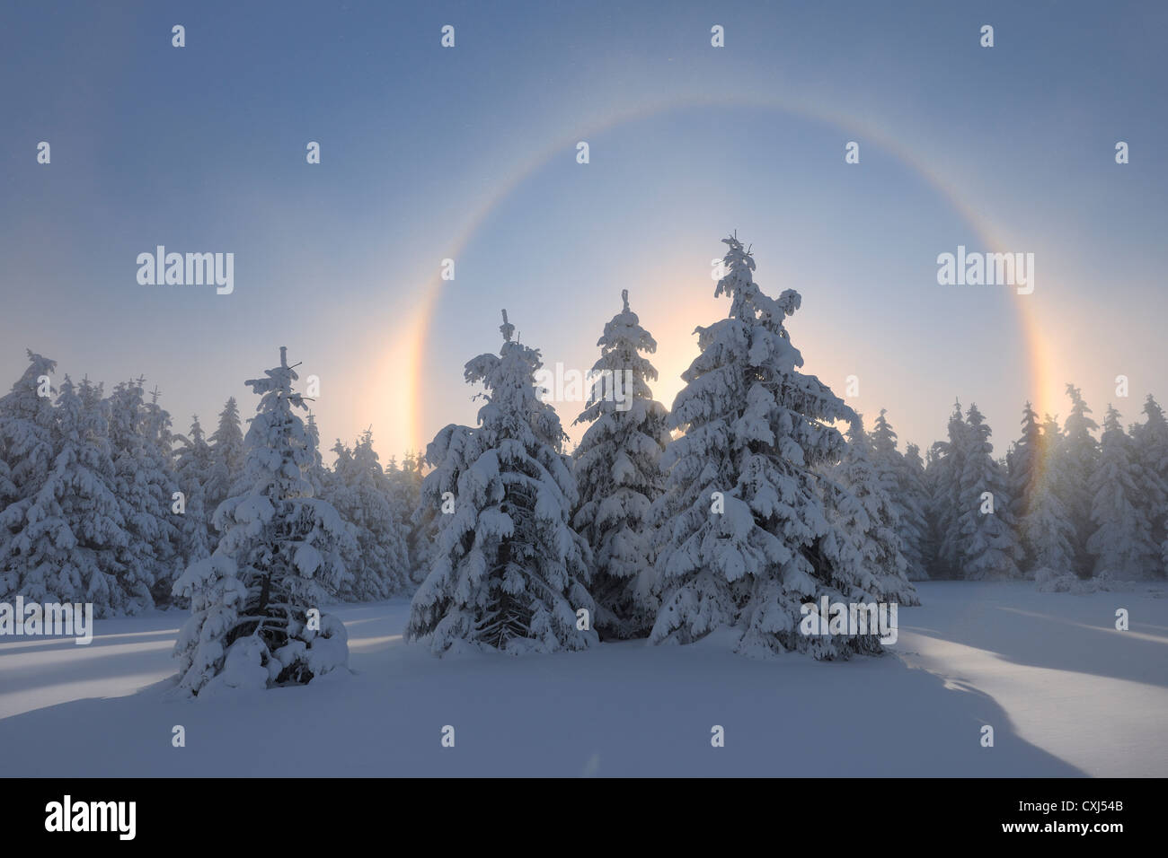 View of sundog with snowy landscape Stock Photo - Alamy