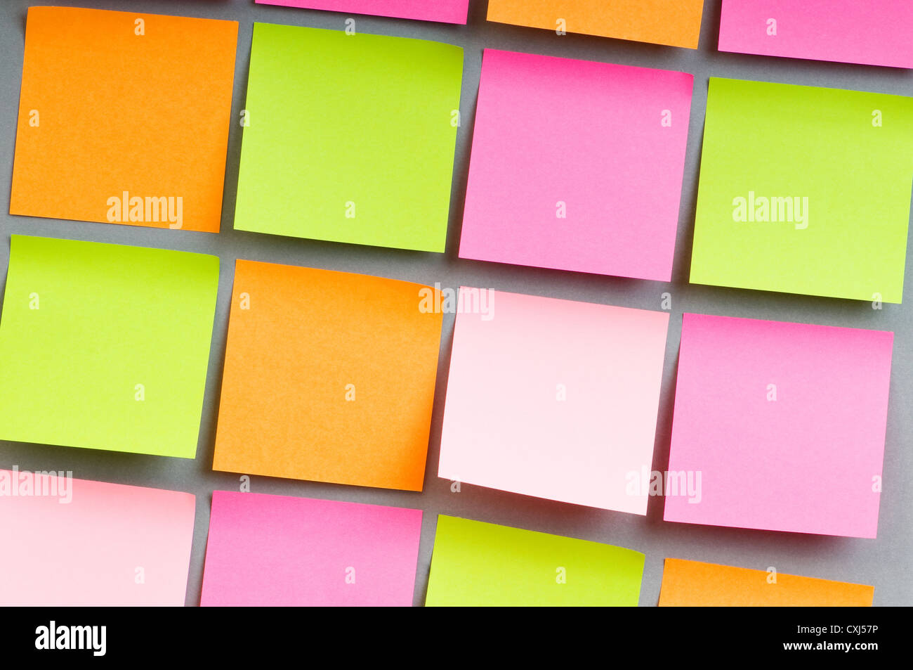 Reminder notes on the bright colorful paper Stock Photo - Alamy