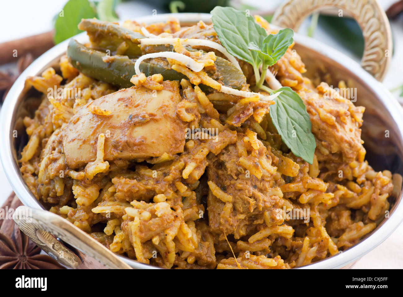 Traditional Indian Biryani as closeup on a brass bowl Stock Photo - Alamy