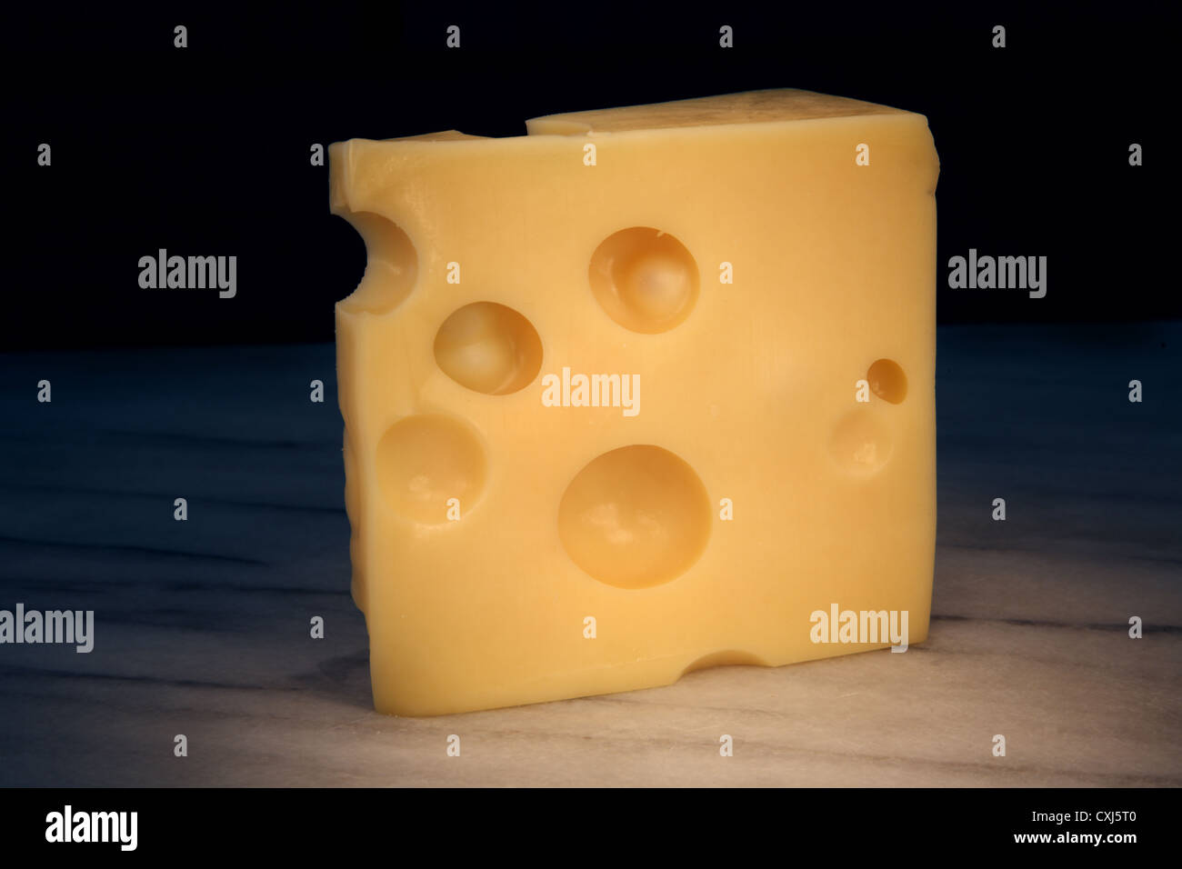 Slice of Emmental Cheese Stock Photo - Alamy