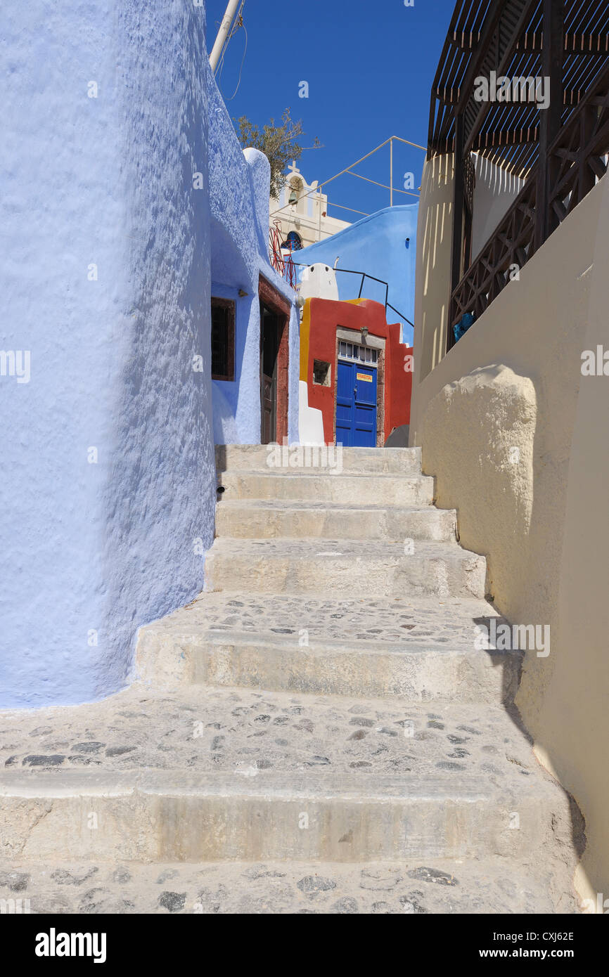 Greece, Colourful houses and cobblestone footpath in traditionally ...