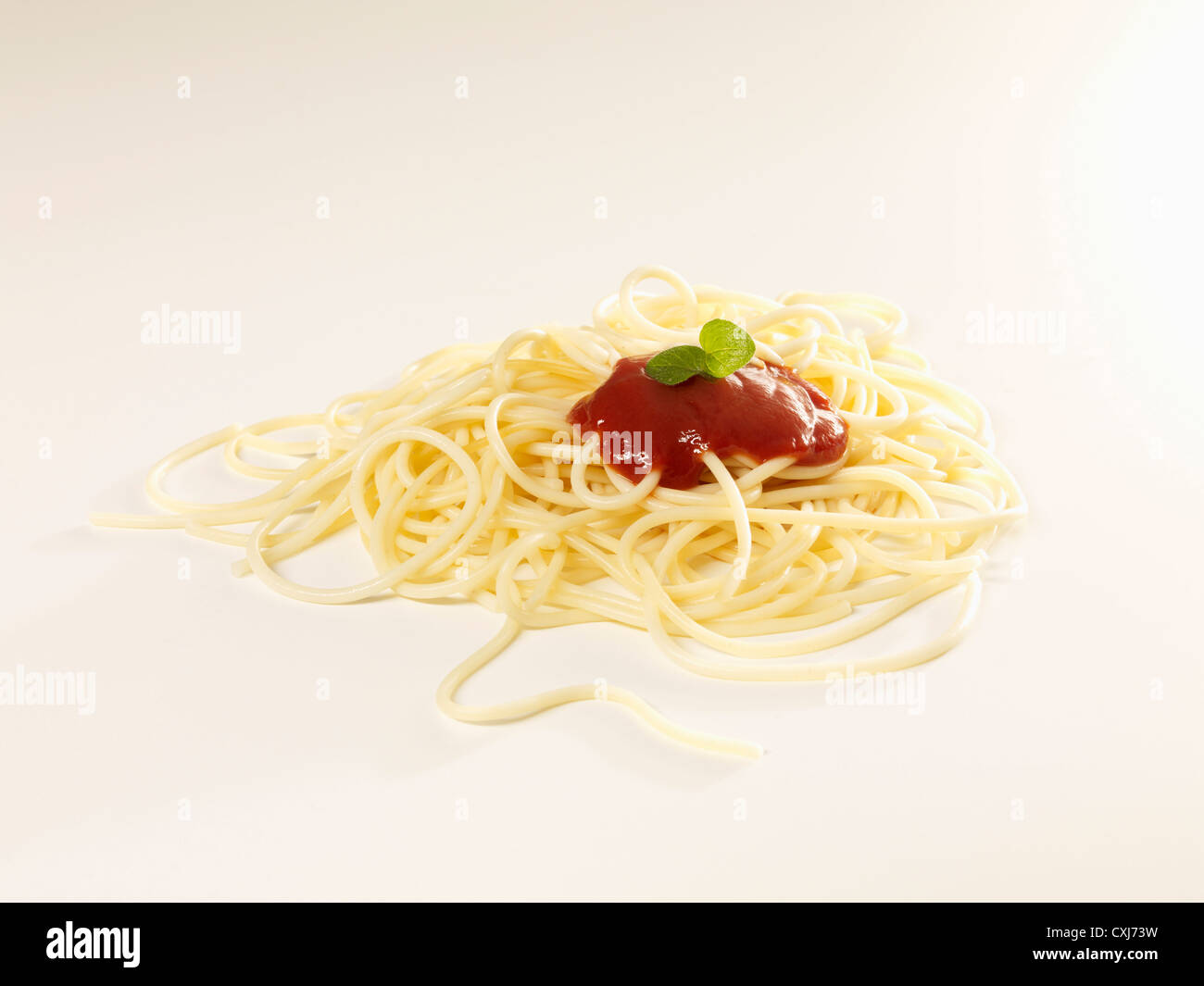 Spaghetti with red tomato sauce on white background Stock Photo - Alamy