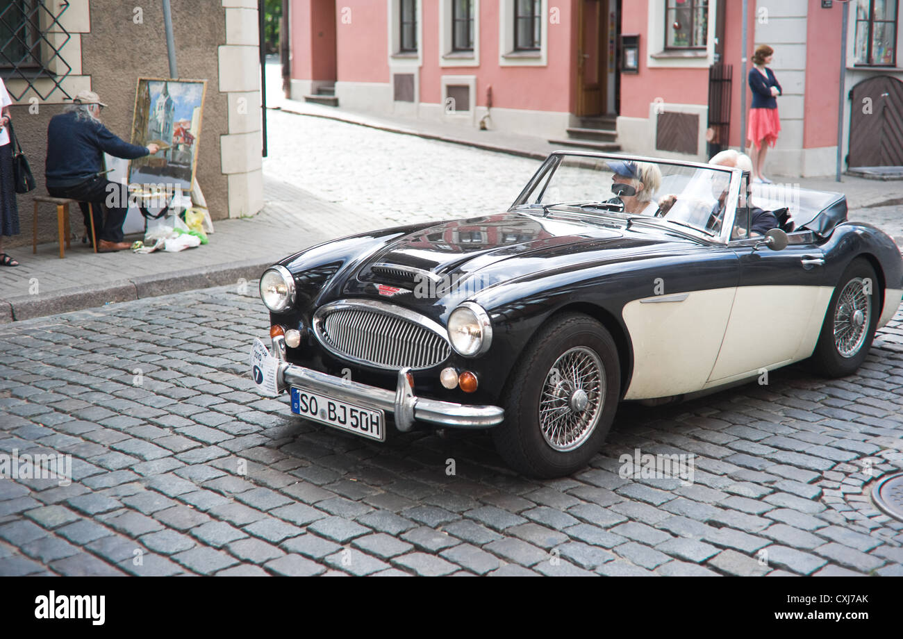 Vintage car in street of old Riga center Stock Photo - Alamy