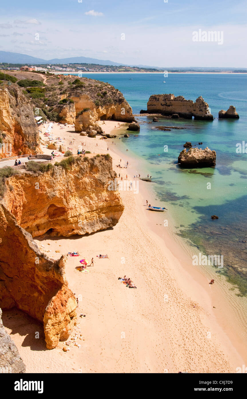 Tourist at praia da dona ana hi-res stock photography and images - Alamy