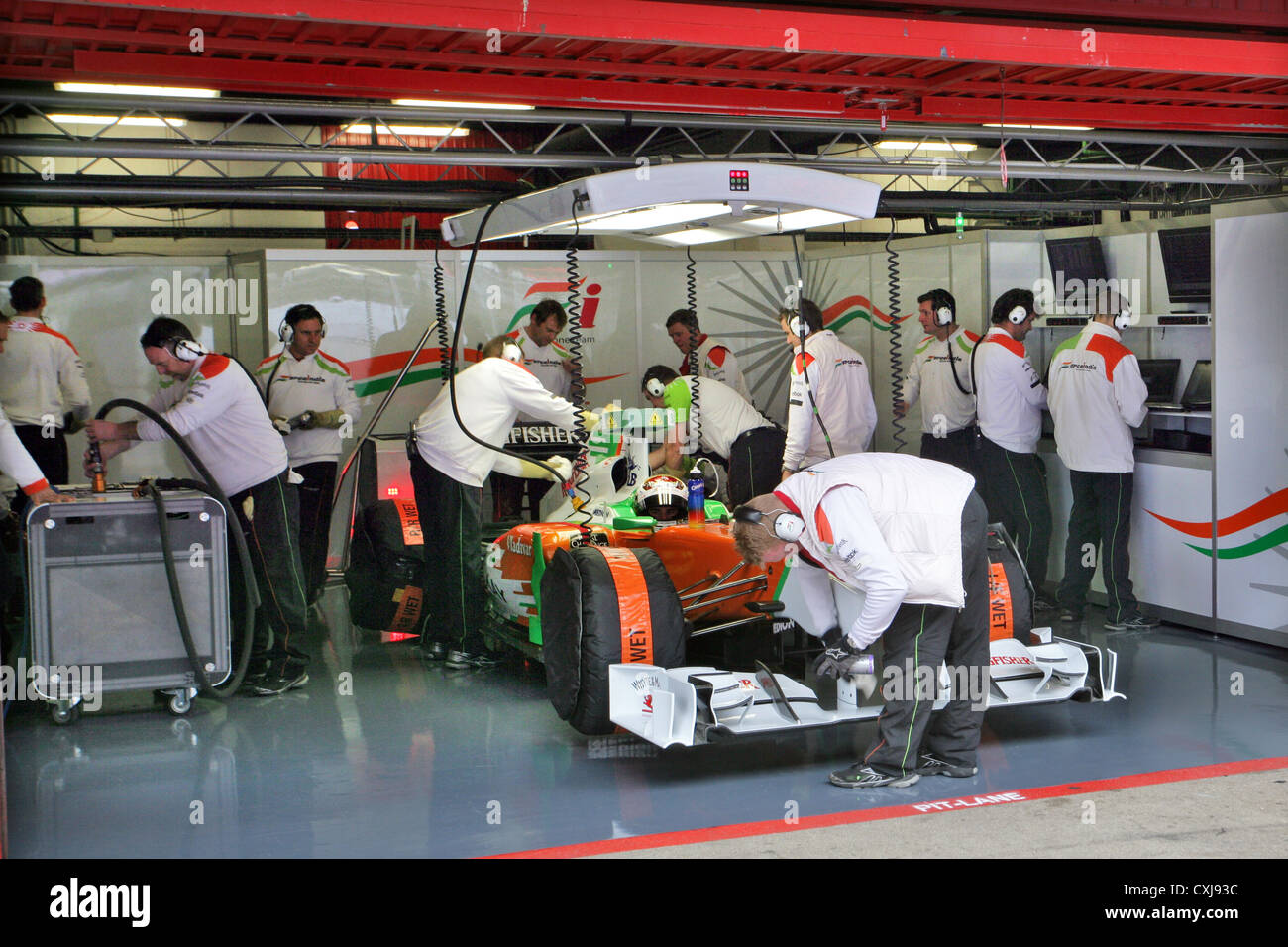 Force India Formula One team pit garage at Montmelo motor racing ...