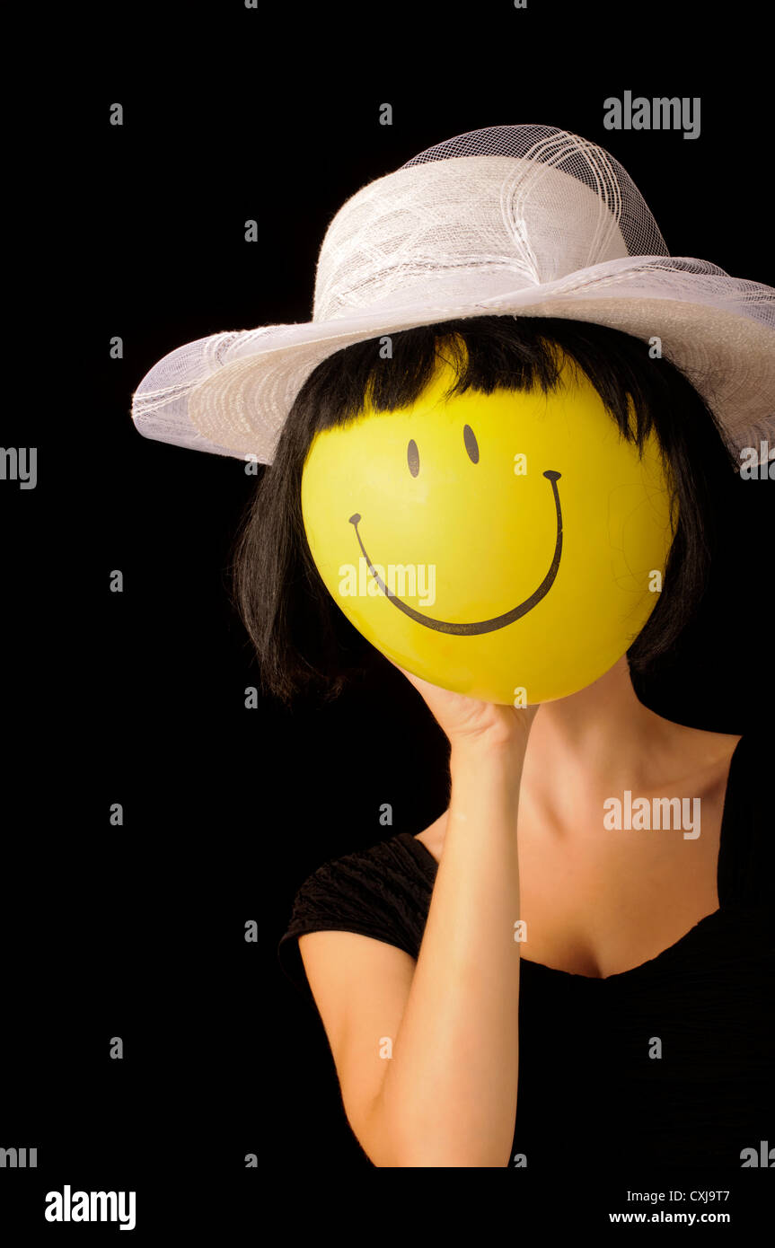 Yellow smiley face balloon hi-res stock photography and images - Alamy