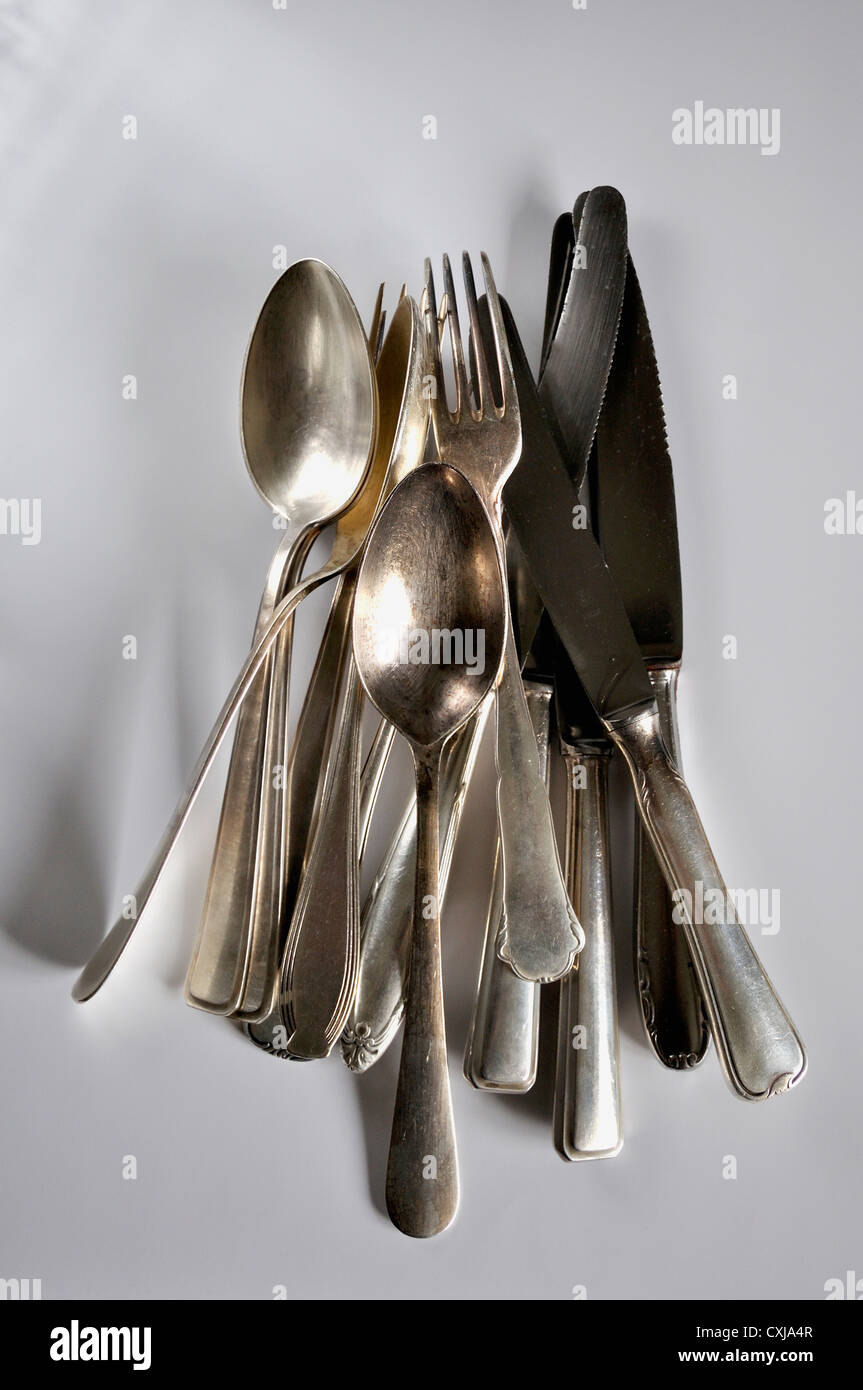 Silver cultery on white background Stock Photo - Alamy