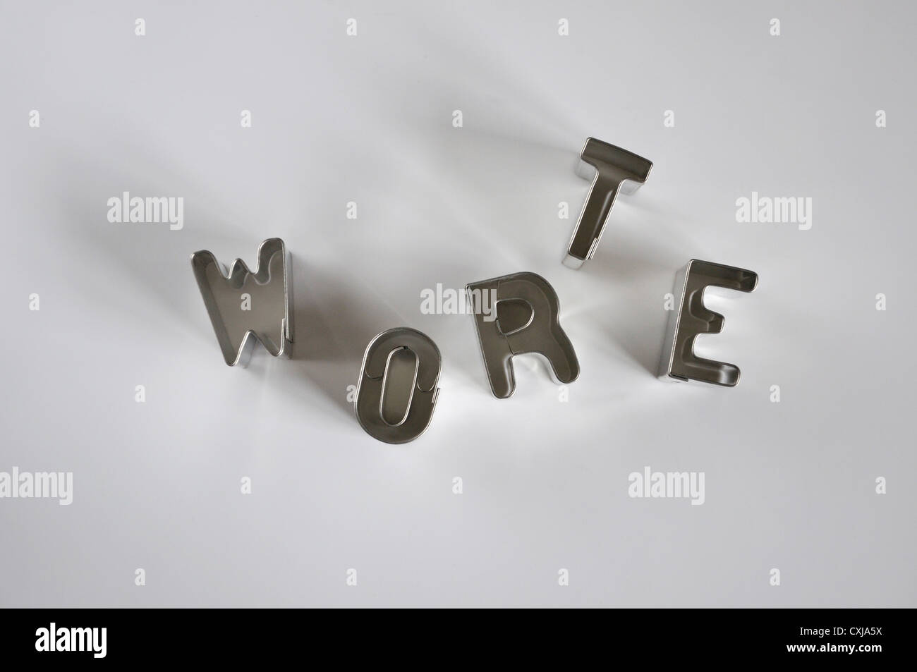 Metal letters on white background Stock Photo - Alamy