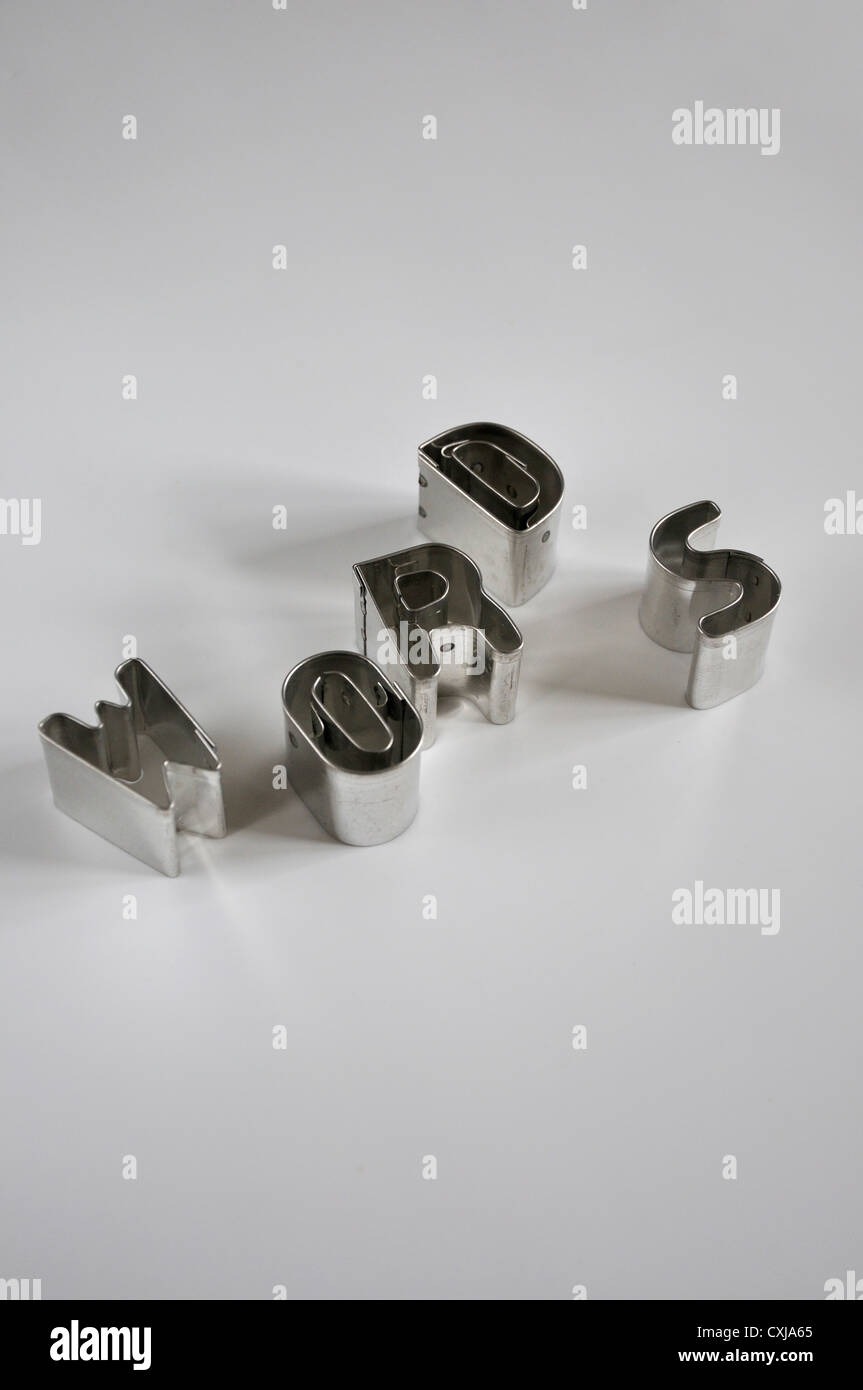 Metal letters on white background Stock Photo - Alamy
