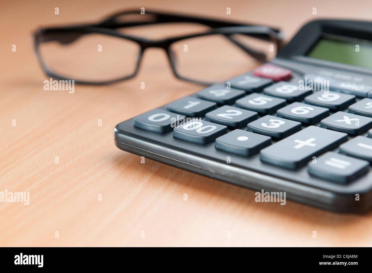 Business concept with accounting calculator Stock Photo - Alamy