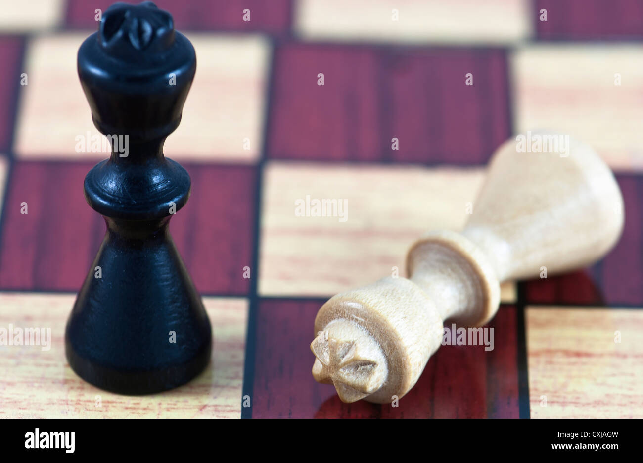 Closeup of checkmate on king Stock Photo - Alamy