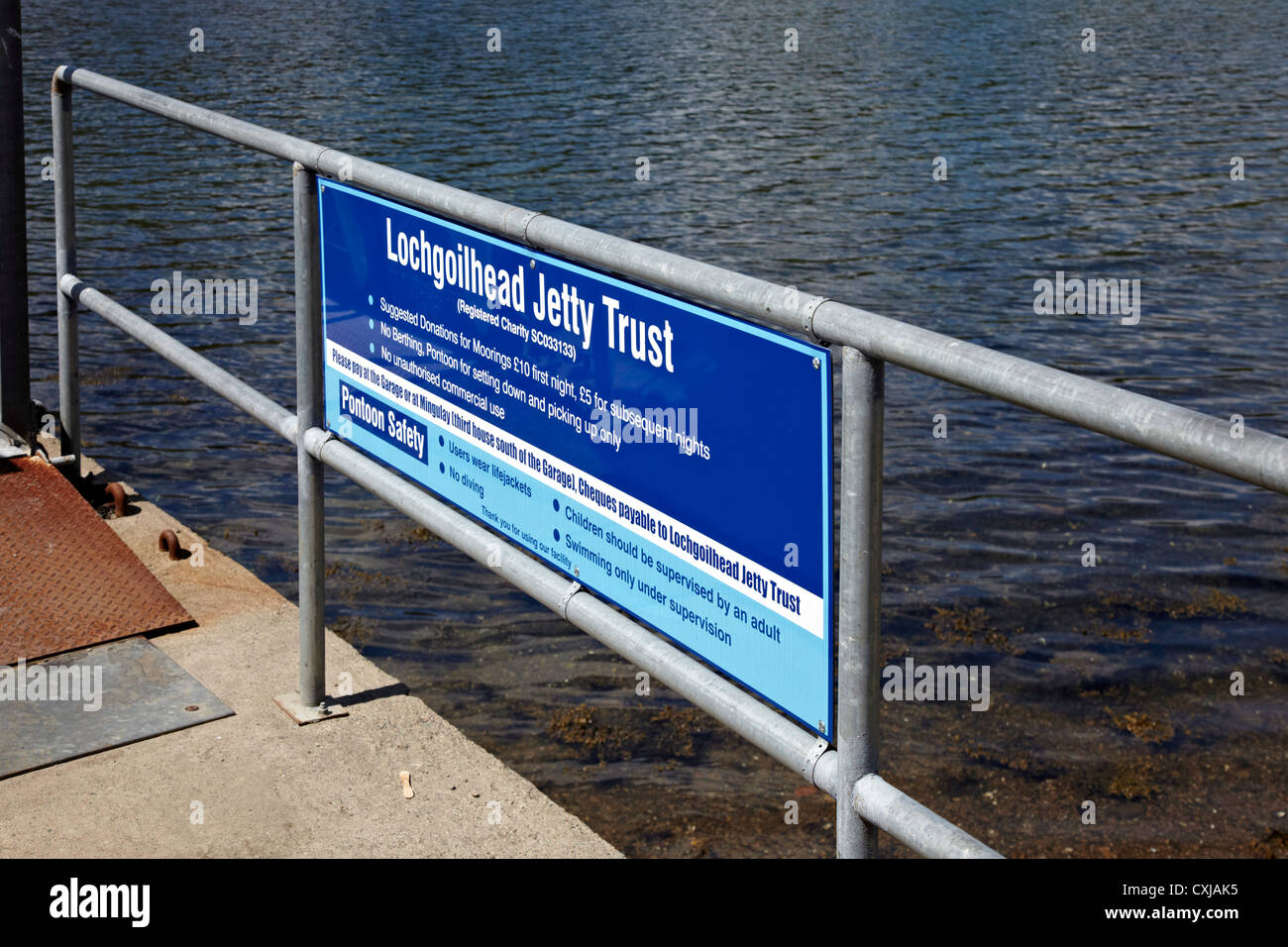 Loch Goilhead jetty Trust information and pontoon safety sign Stock ...