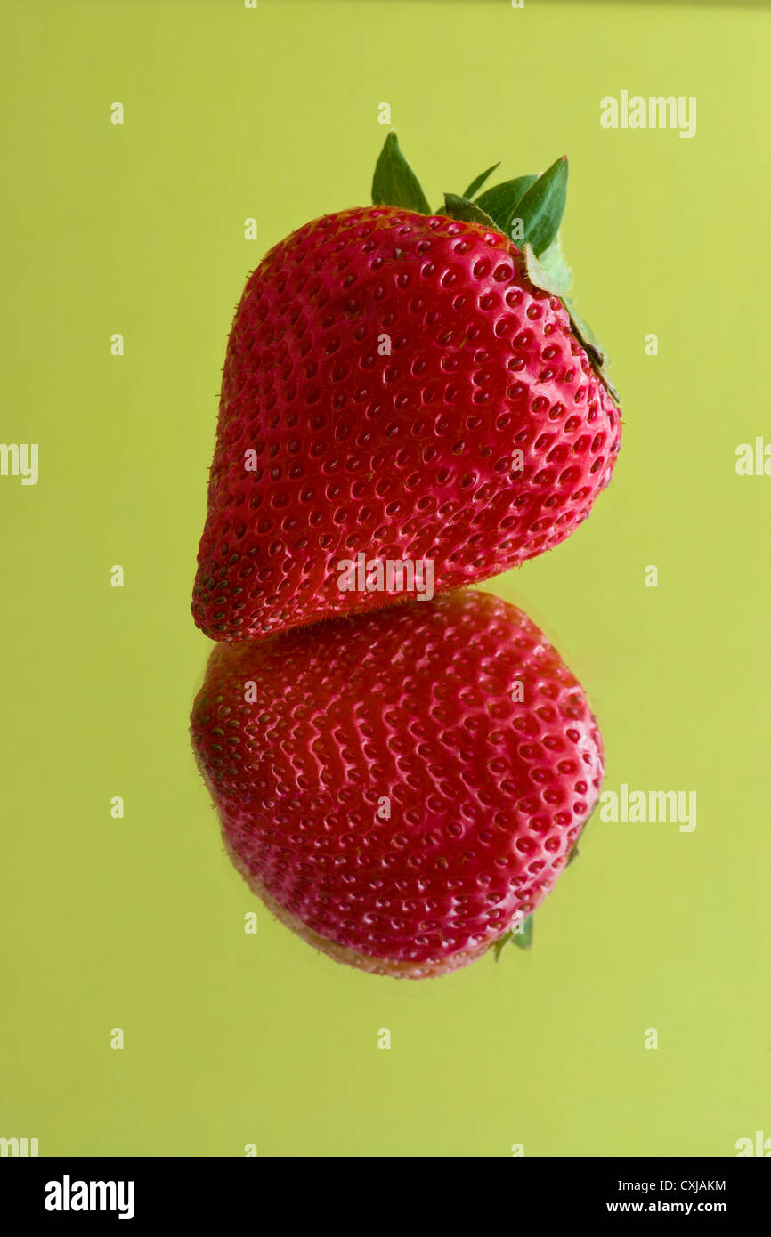 Strawberries & reflections in a mirror Stock Photo - Alamy