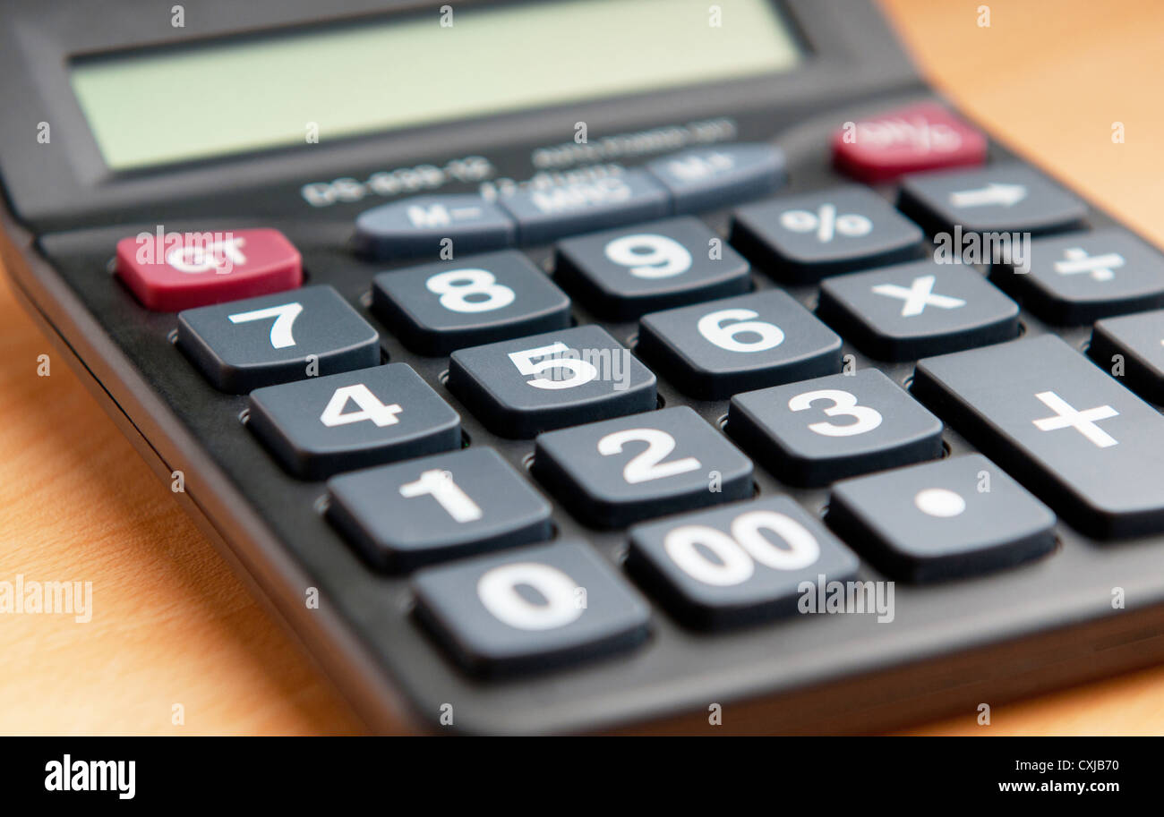Business concept with accounting calculator Stock Photo - Alamy