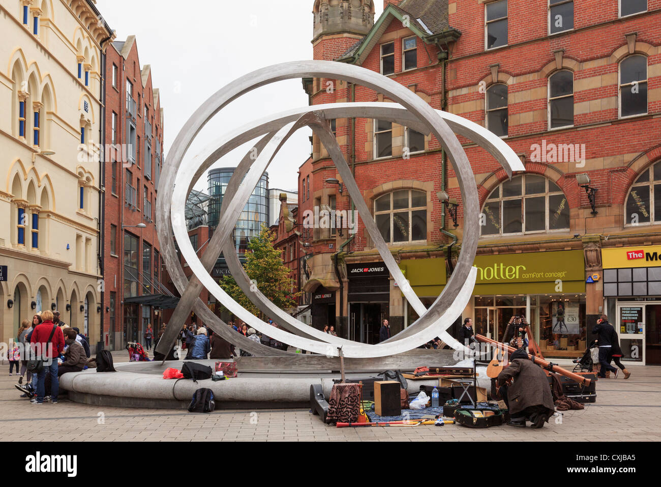 Street scene by Spirit of Belfast steel sculpture by Dan George ...