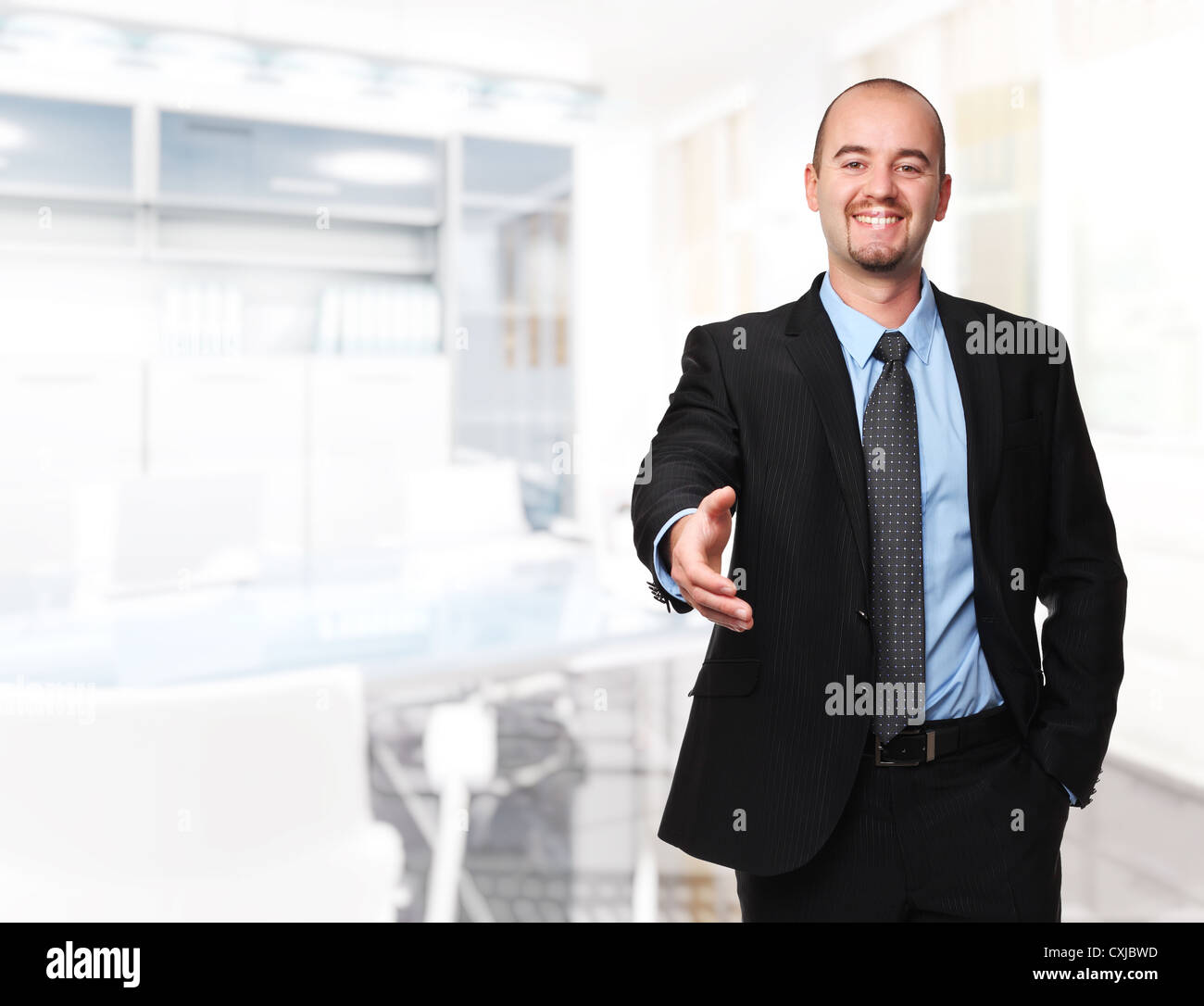 man shake hand in modern office Stock Photo - Alamy
