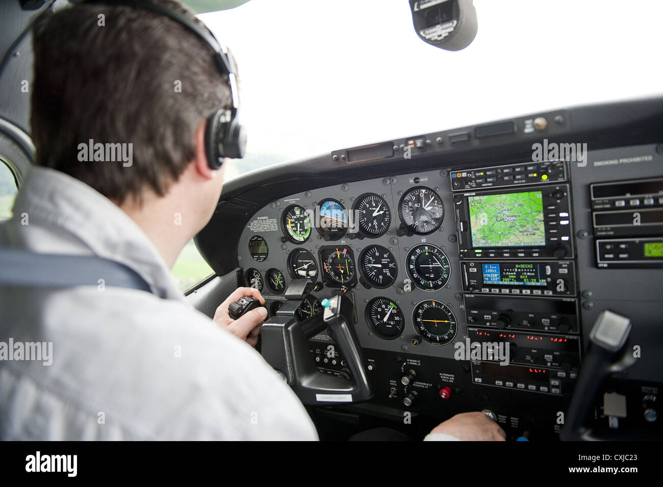 Pilot in cockpit Stock Photo - Alamy