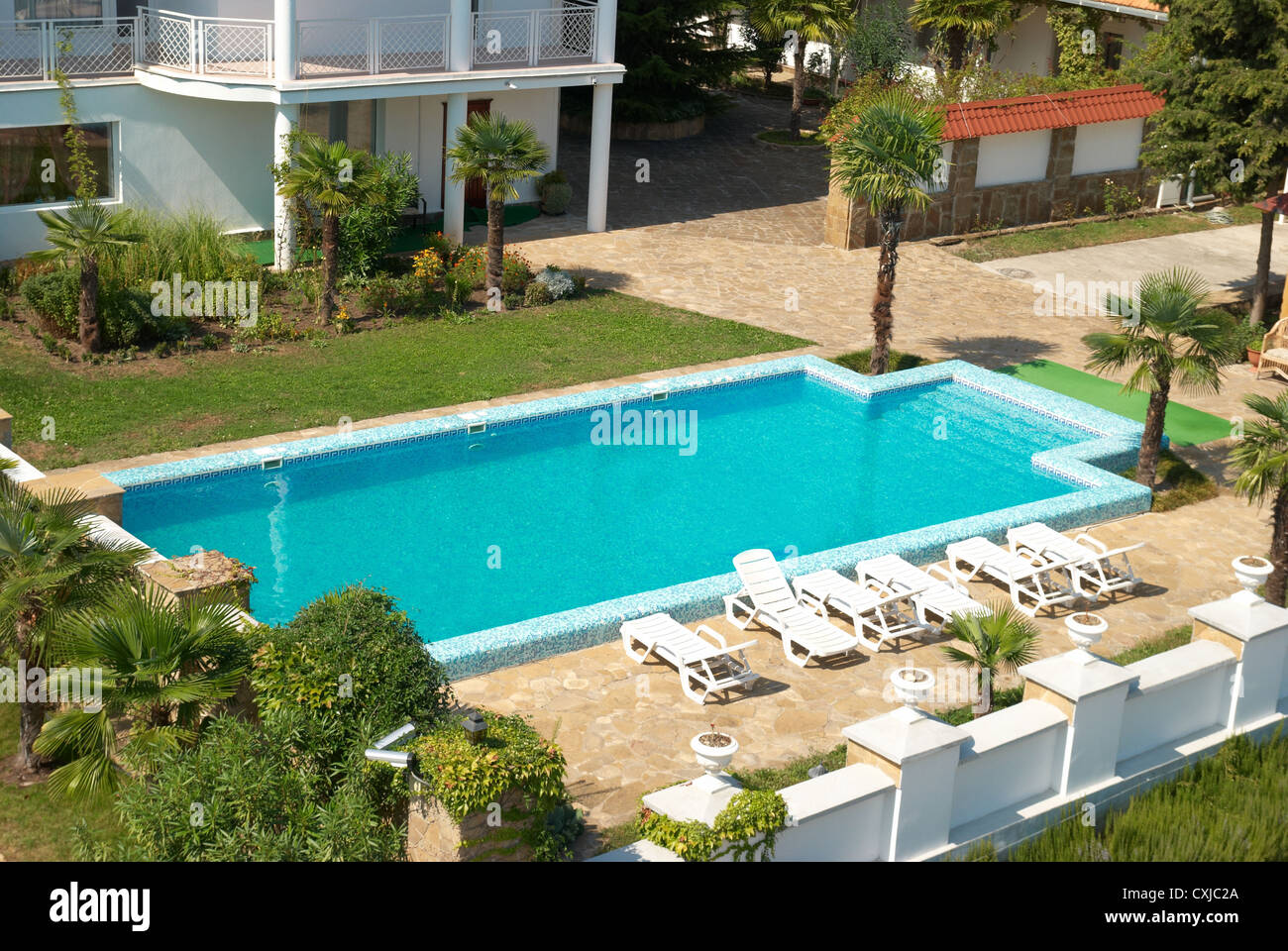 House with the blue pool Stock Photo - Alamy