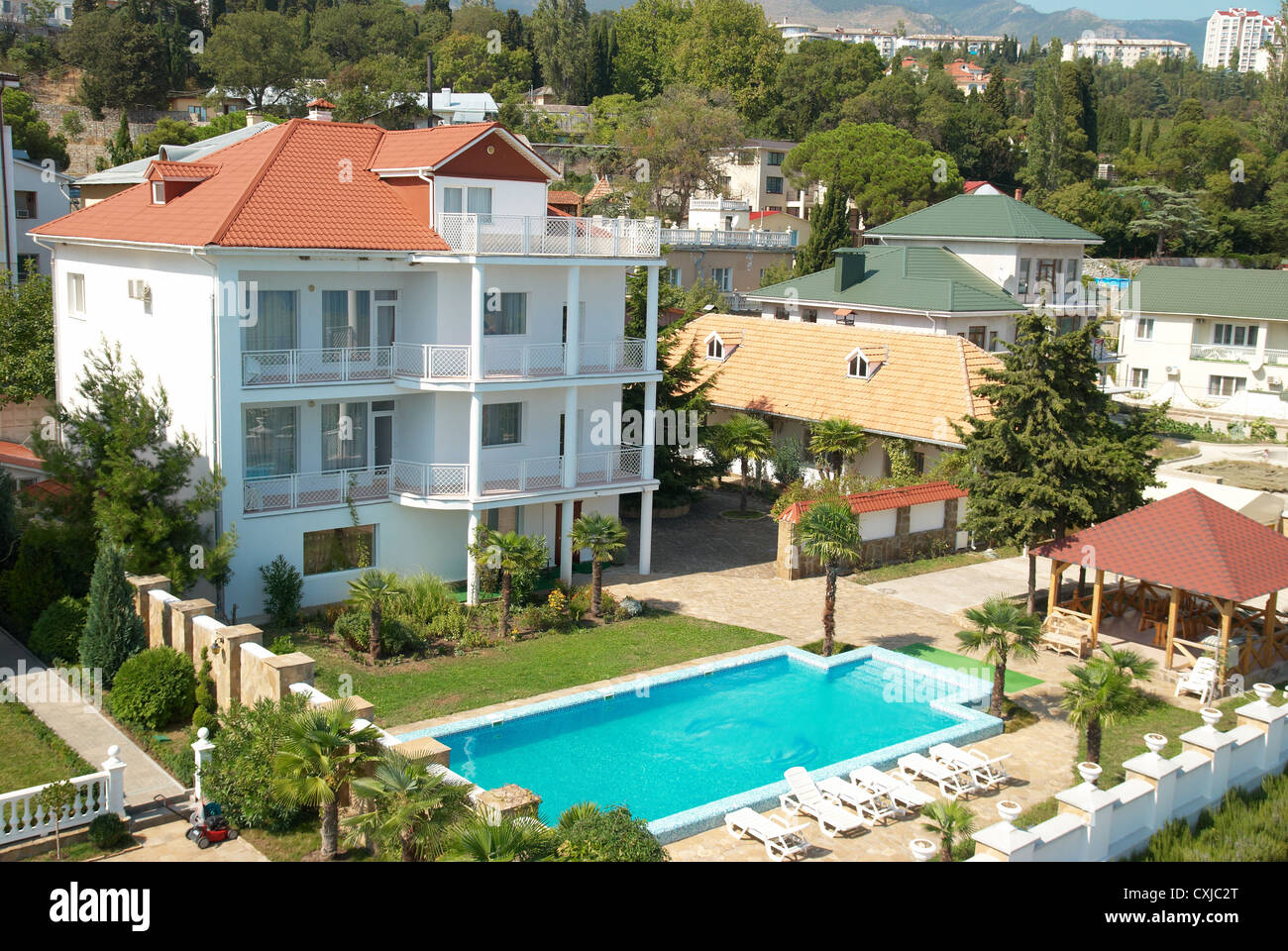 House with the blue pool Stock Photo - Alamy