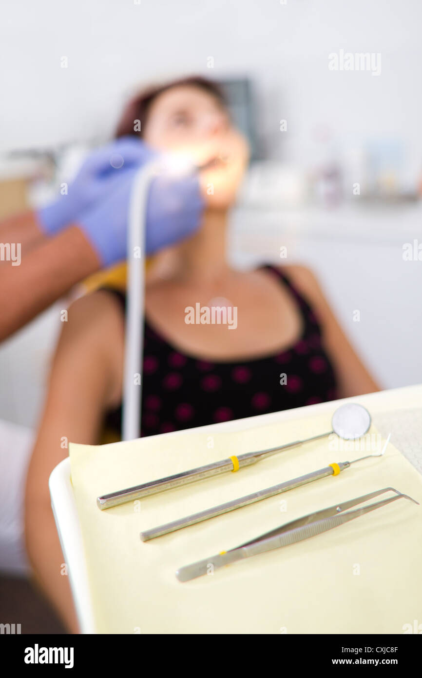 Germany, Brandenburg, Strausberg, Dentist examining patients teeth ...