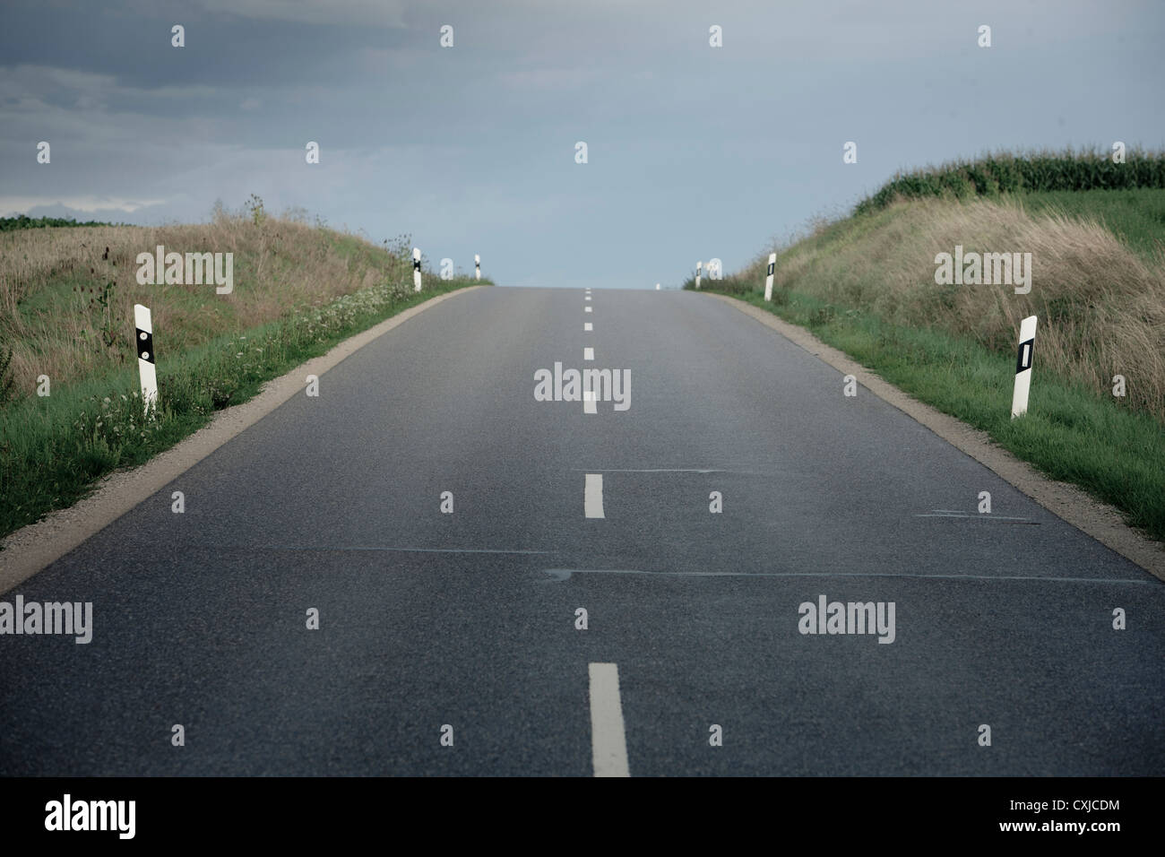 Germany, Ingolstadt, View of empty country road Stock Photo - Alamy