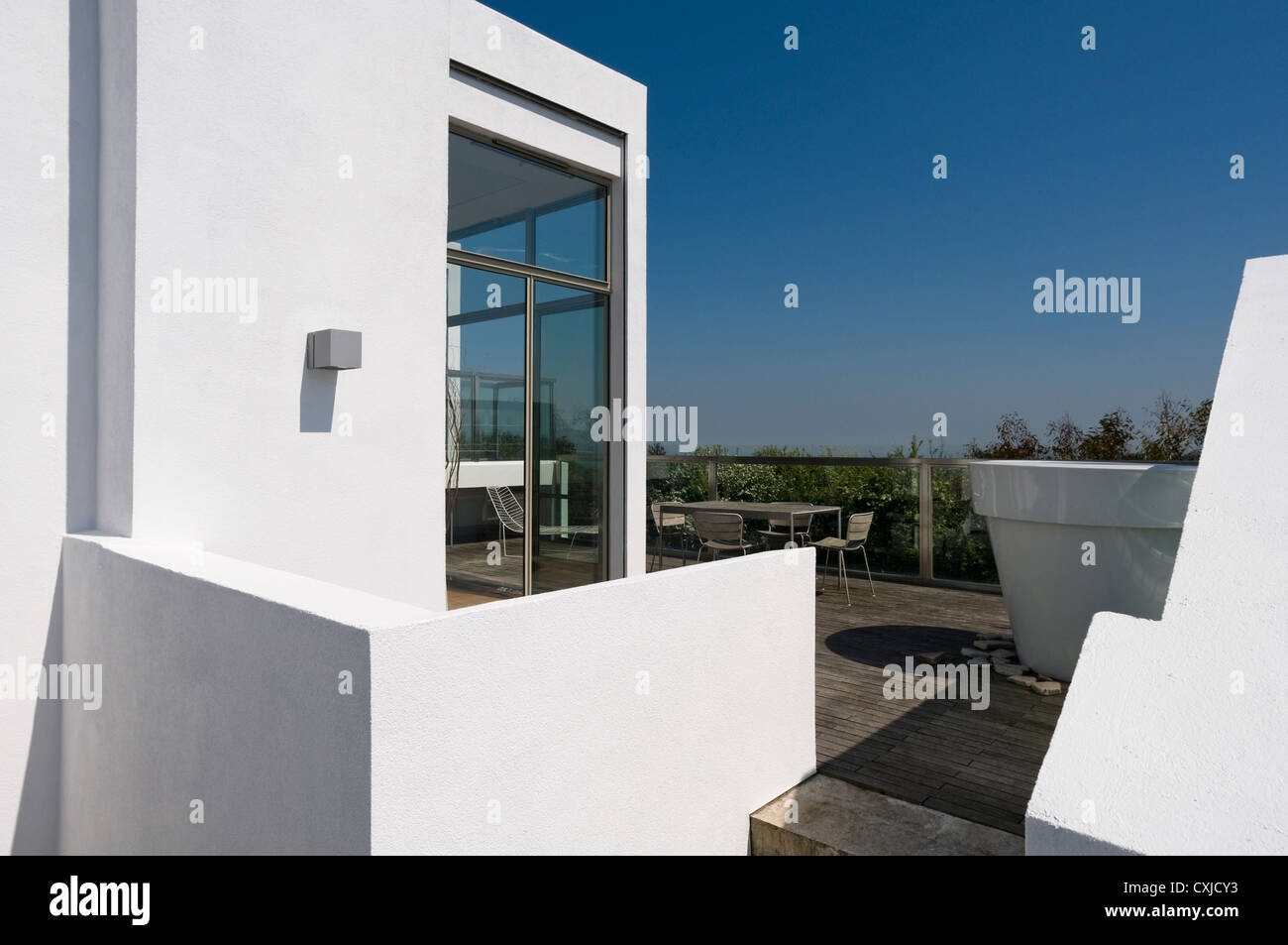 New build exterior on split levels with extensive use of glass Stock ...