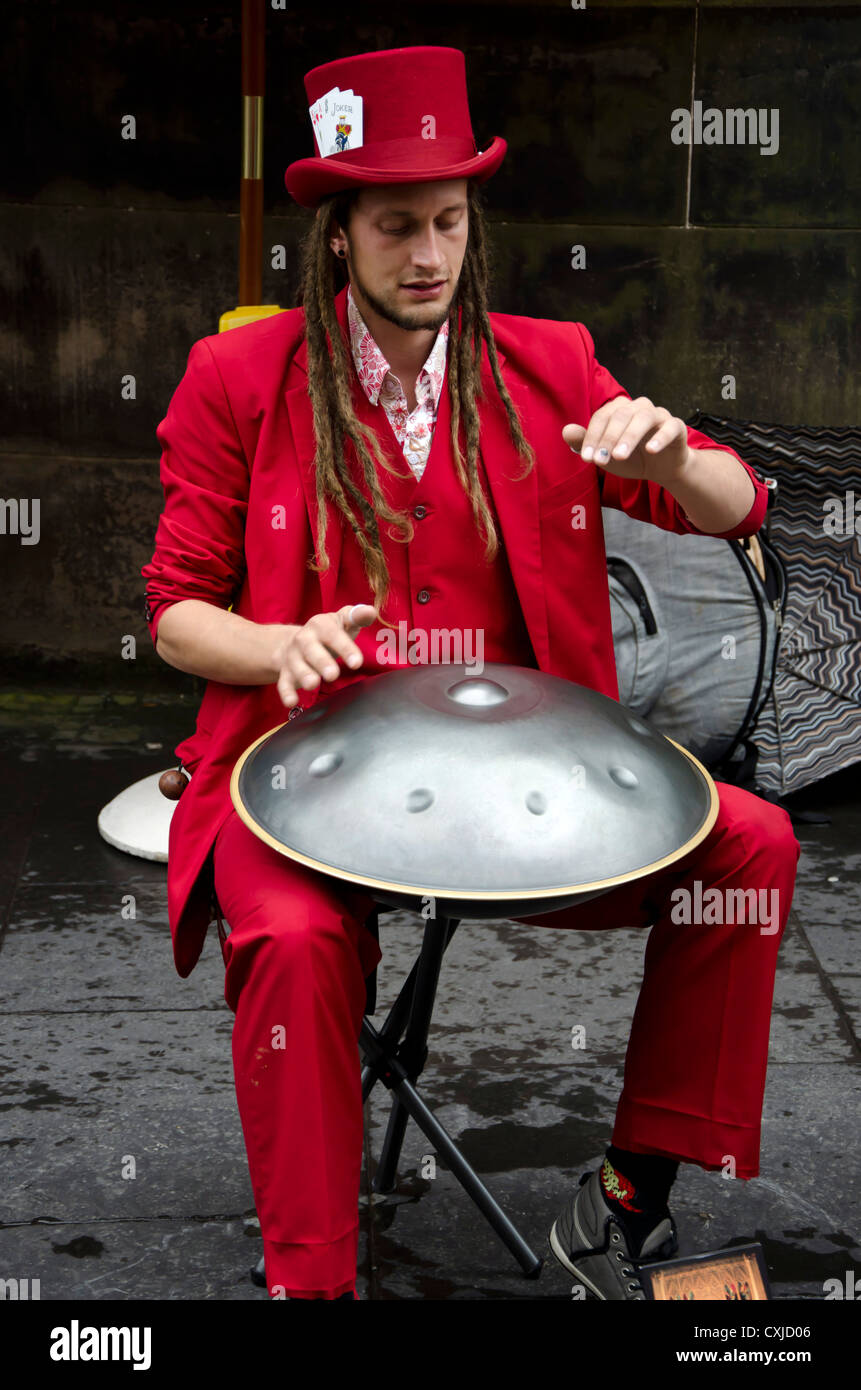 Man playing PANart unusual percussive instrument busking in the Royal ...